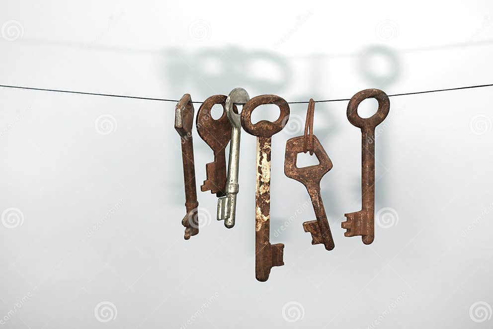 A Different Old Retro Rusty Keys from Different Locks Hanging on String ...