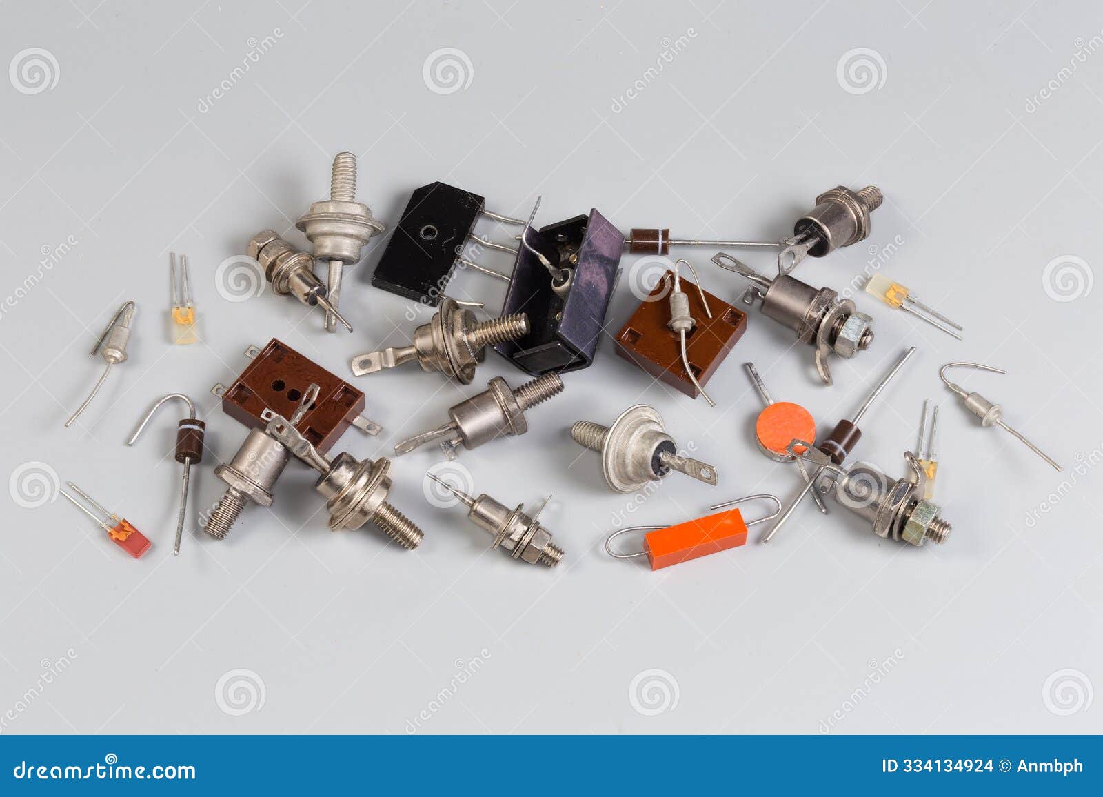 Different Old Semiconductor Diodes in Various Packages on Gray Surface ...