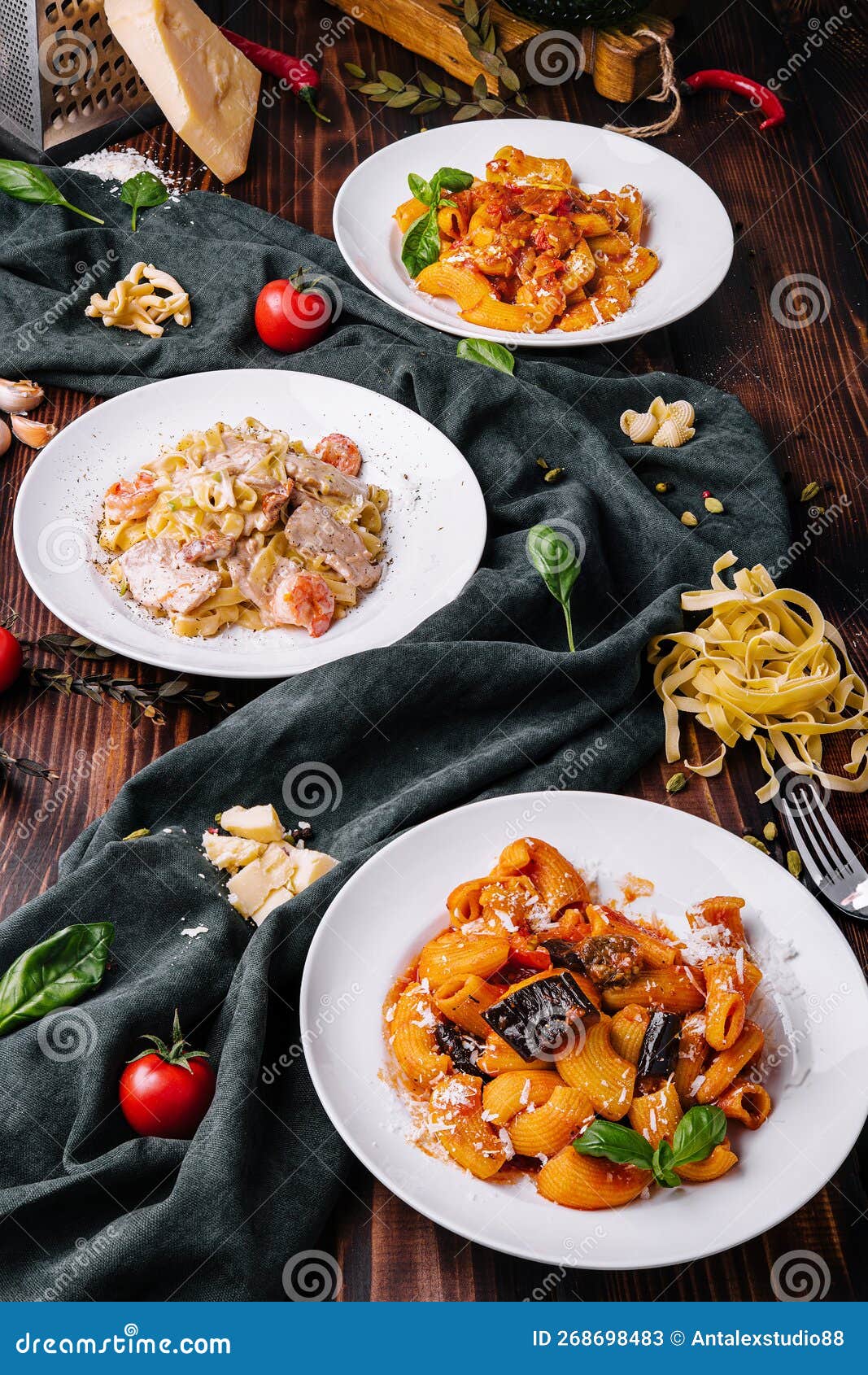 Different Pasta Dishes on Wooden with Fabric Stock Image - Image of ...