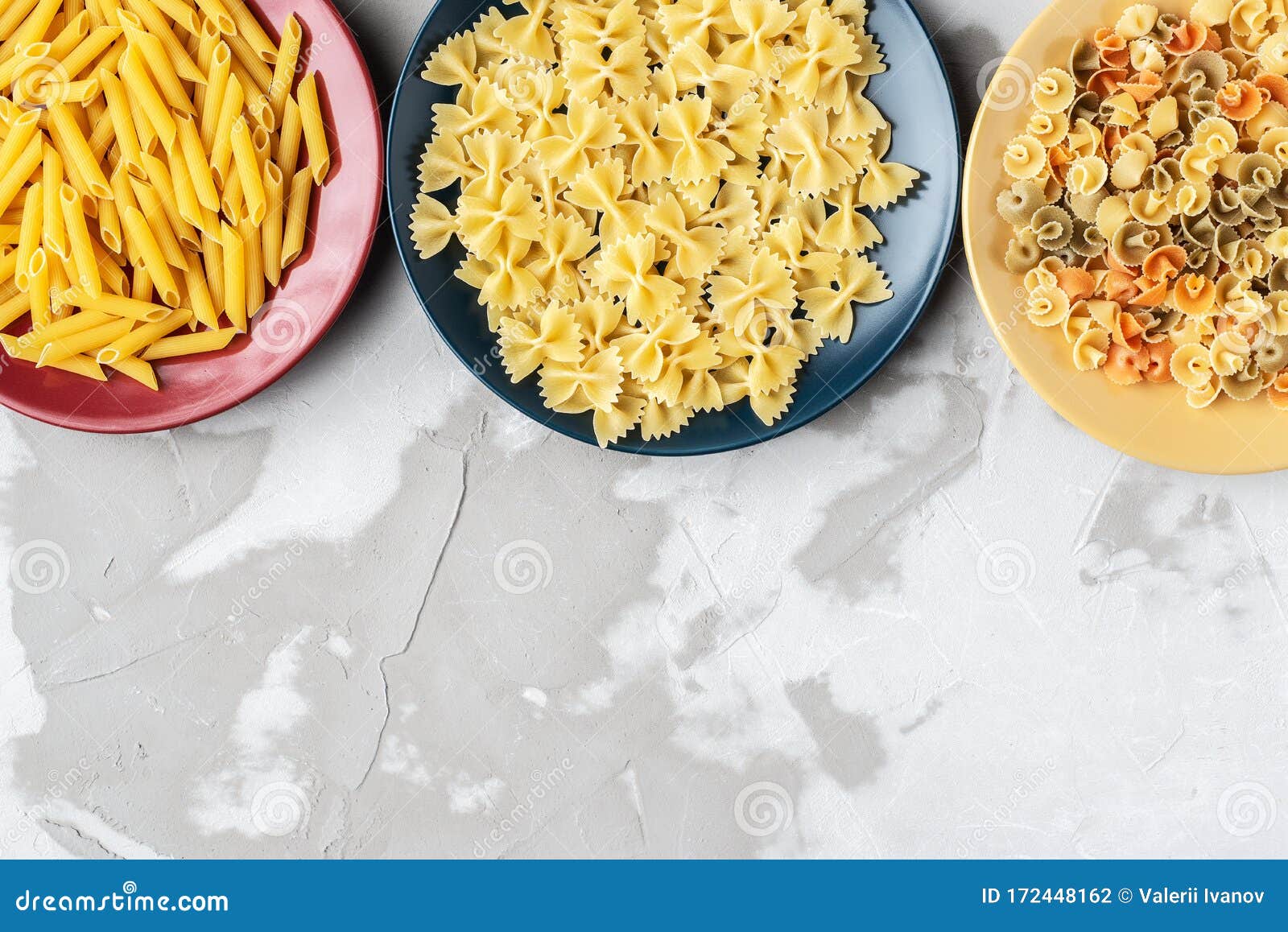 Different Paste on Ceramic Plates of Red, Yellow and Blue Colors on a ...