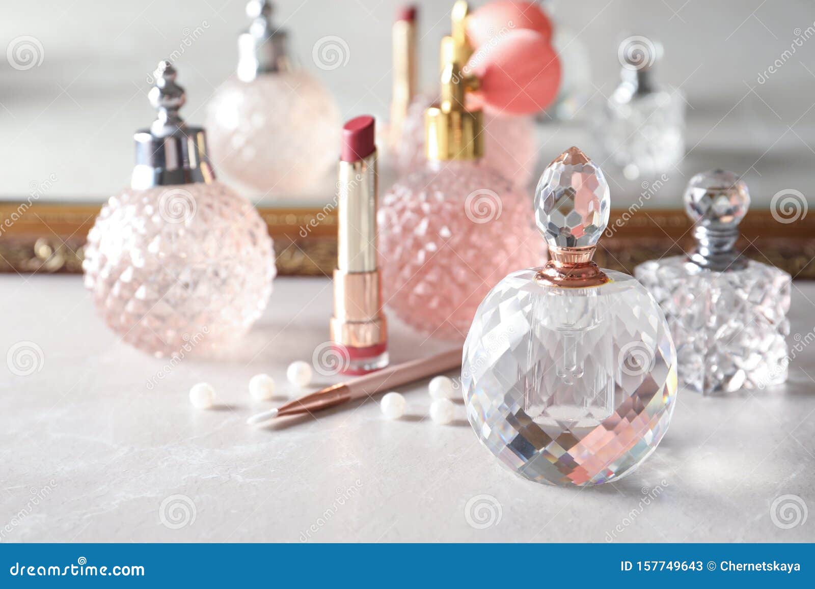 Different Perfume Bottles on Dressing Table Stock Image - Image of ...