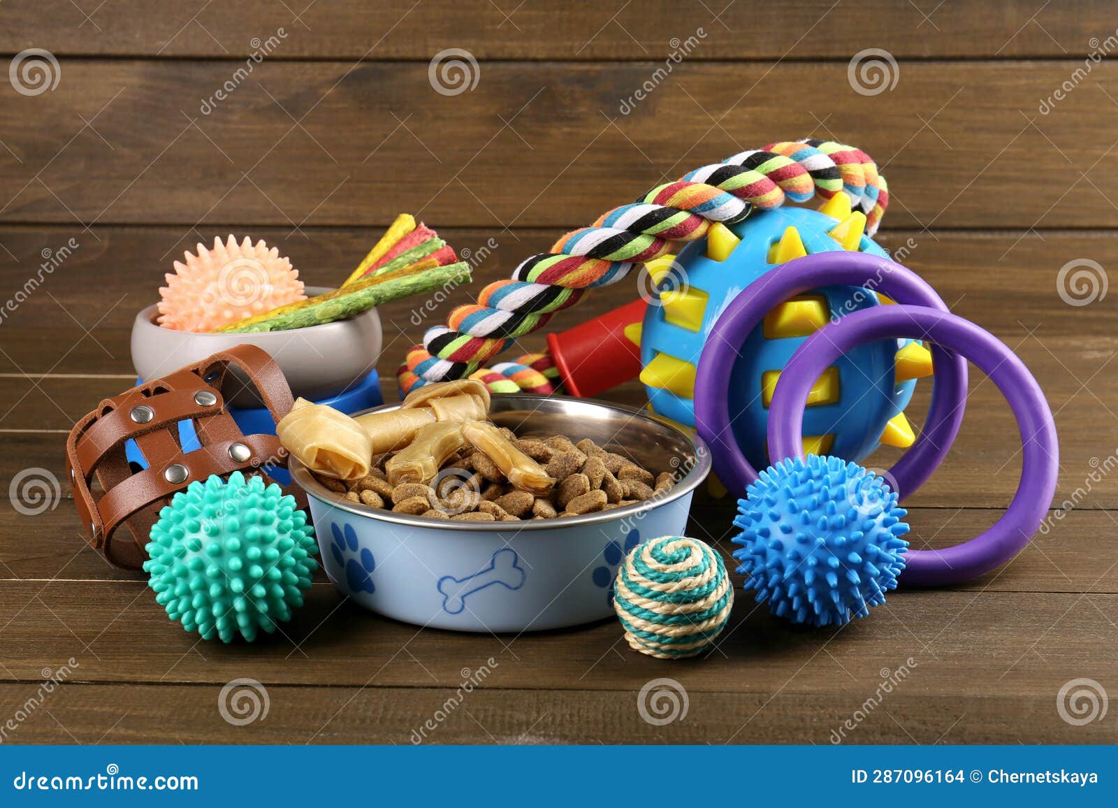 Different Pet Goods on Wooden Table. Shop Assortment Stock Photo ...