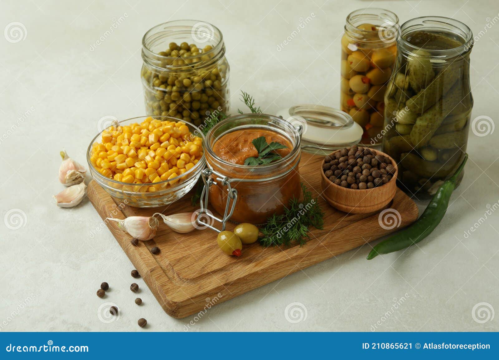 Different Pickled Food and Ingredients on White Textured Table Stock ...