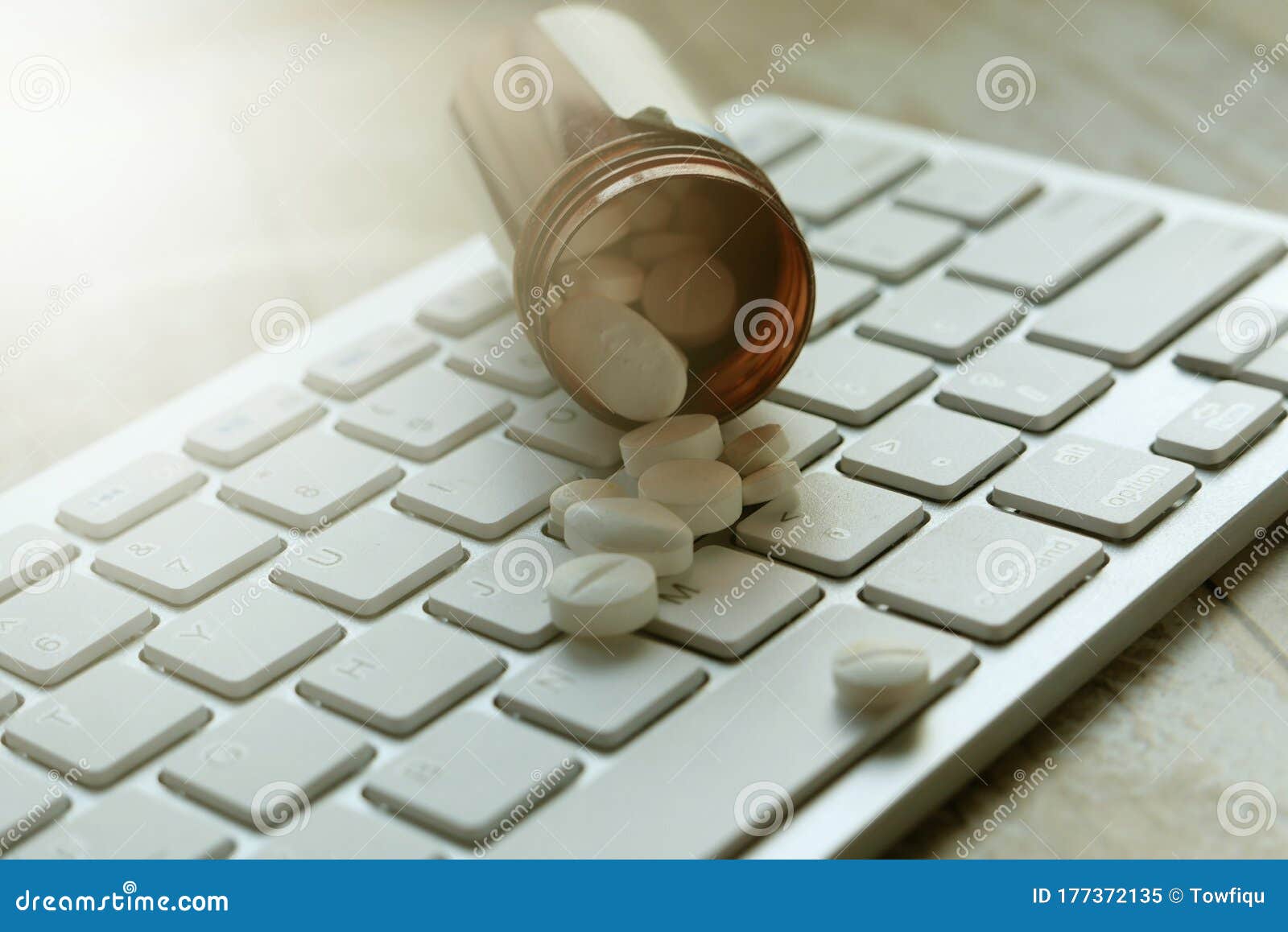 Different Pills and Computer Keyboard on Doctor`s Table. Stock Image ...