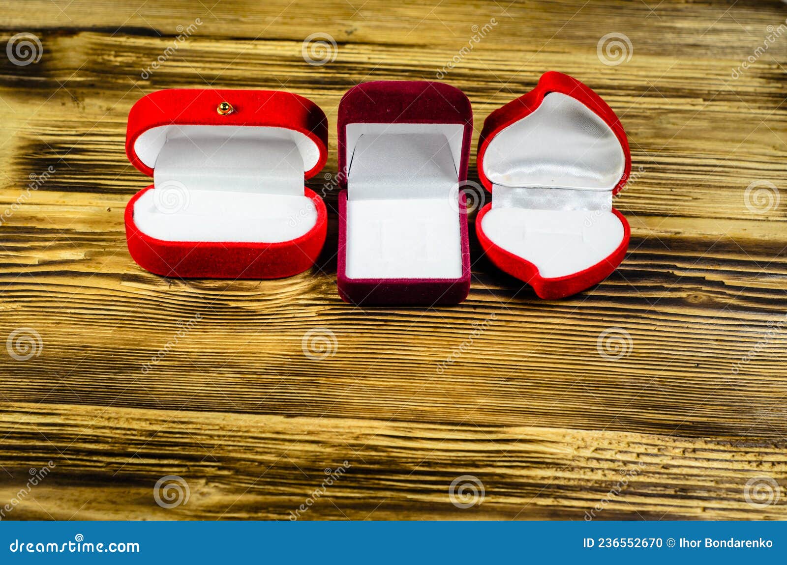 Different Red Jewelry Boxes on Wooden Table Stock Photo - Image of love ...