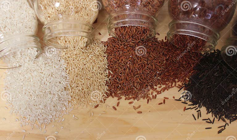 Different Rice Varieties in Rustic Kitchen. Stock Photo - Image of ...