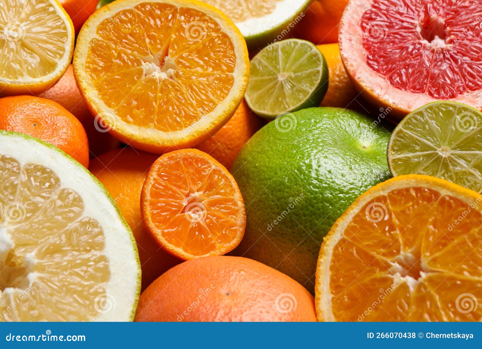 Different Ripe Citrus Fruits As Background, Closeup Stock Photo - Image ...