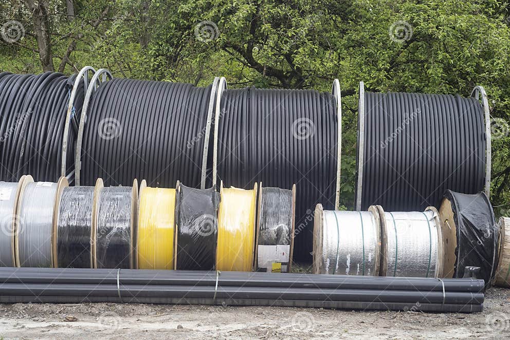 Different Rolls of Telecommunication Cable Coiled Up on Construction ...