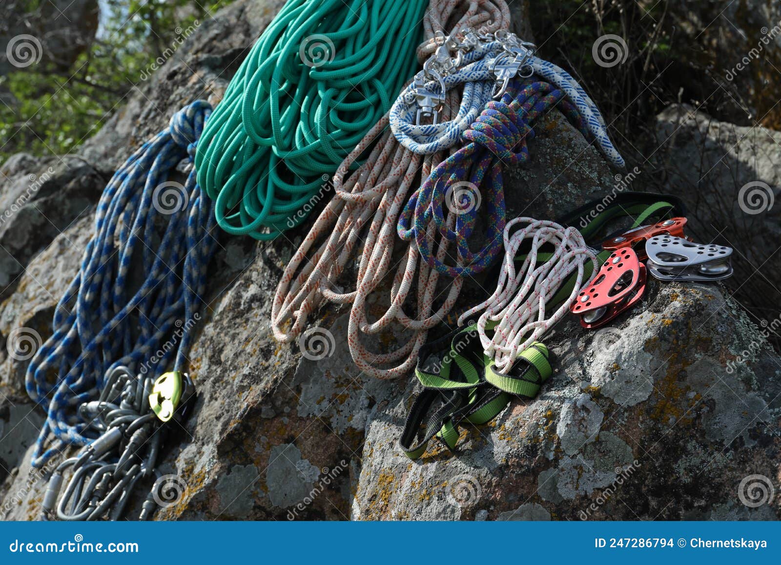 Different Ropes and Other Climbing Equipment on Rocks Outdoors Stock ...