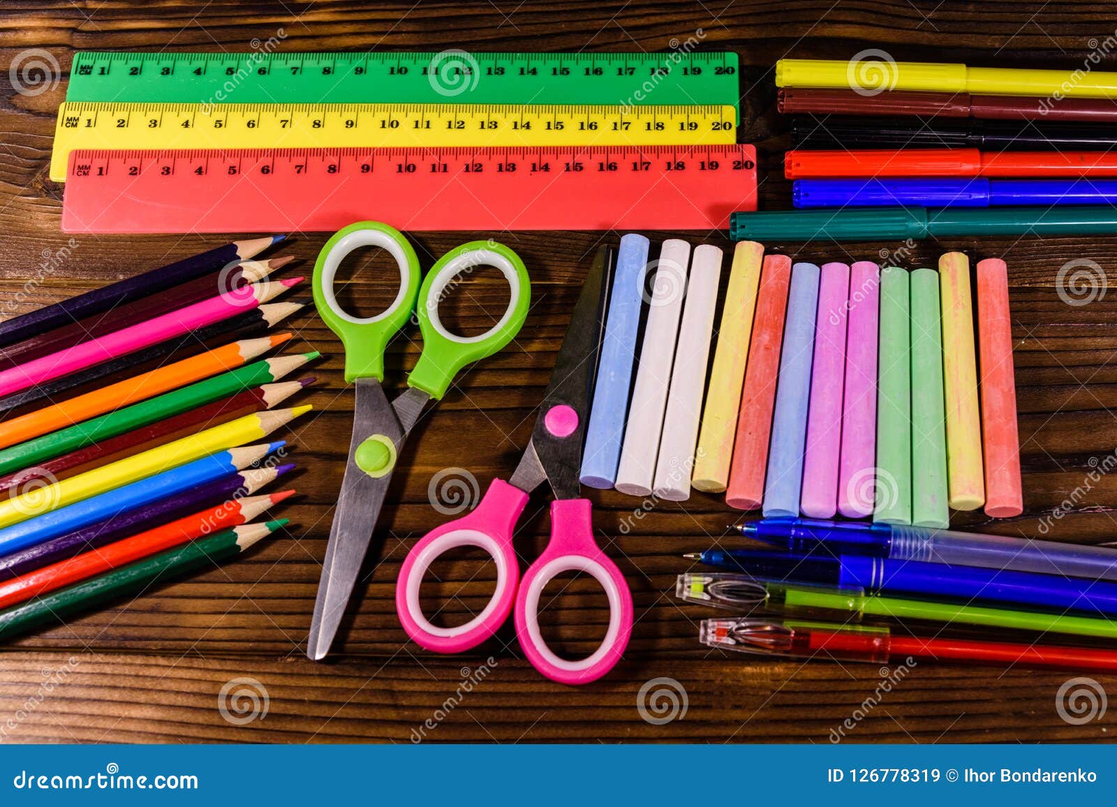 Different School Stationeries on a Dark Wooden Table. Top View Stock ...