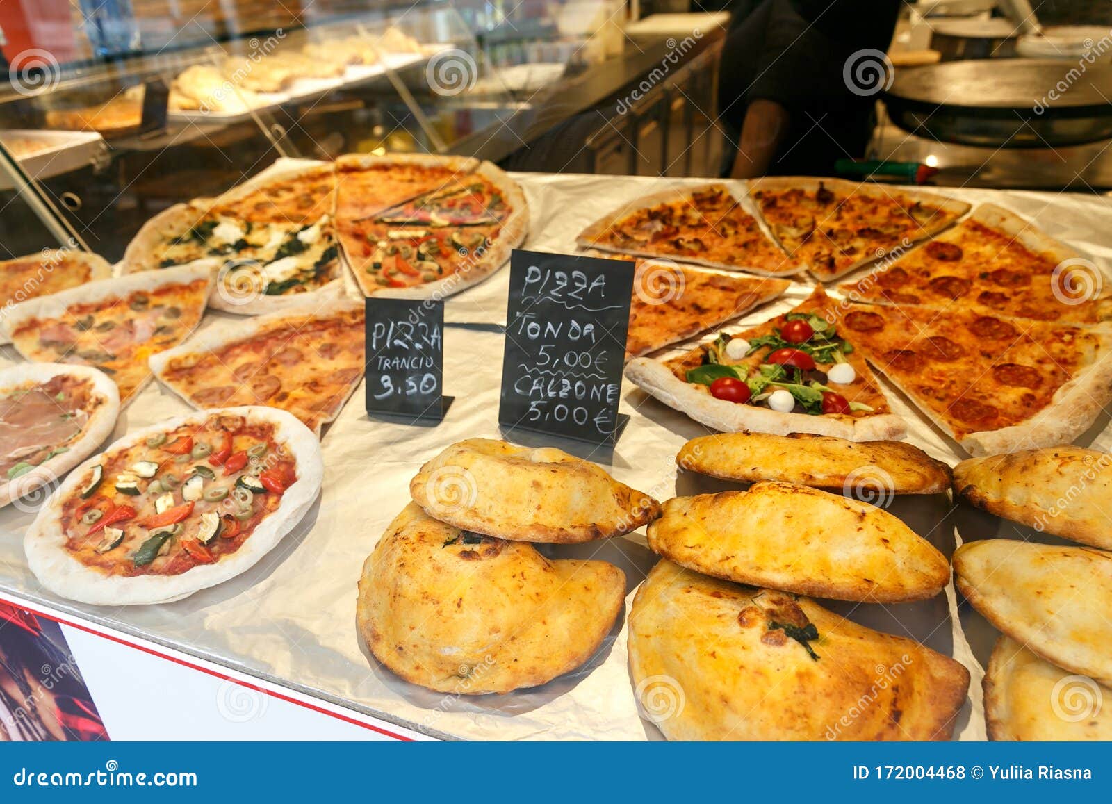 Different See Pizzas on Display in an Italian Store or Bar Stock Photo ...