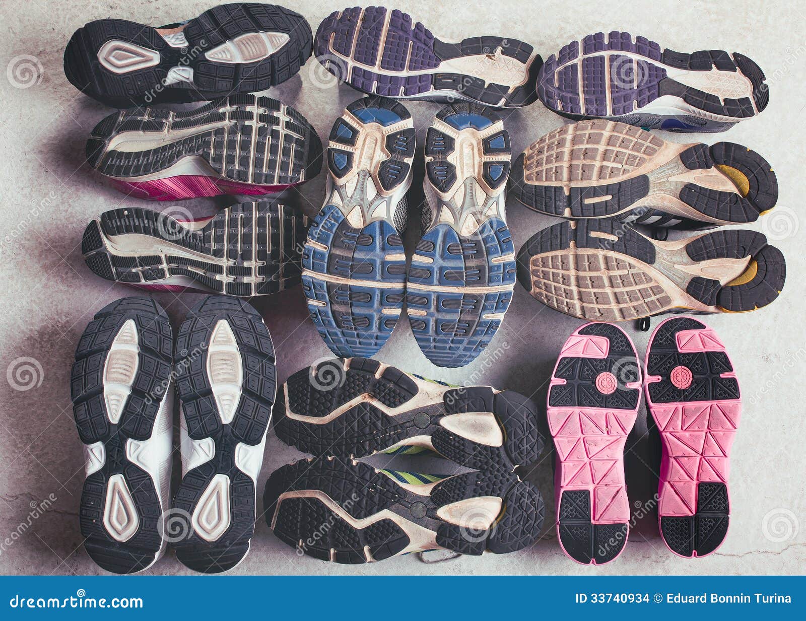 Different Shoe Sole On A Grey Background. Stock Photo - Image of ...