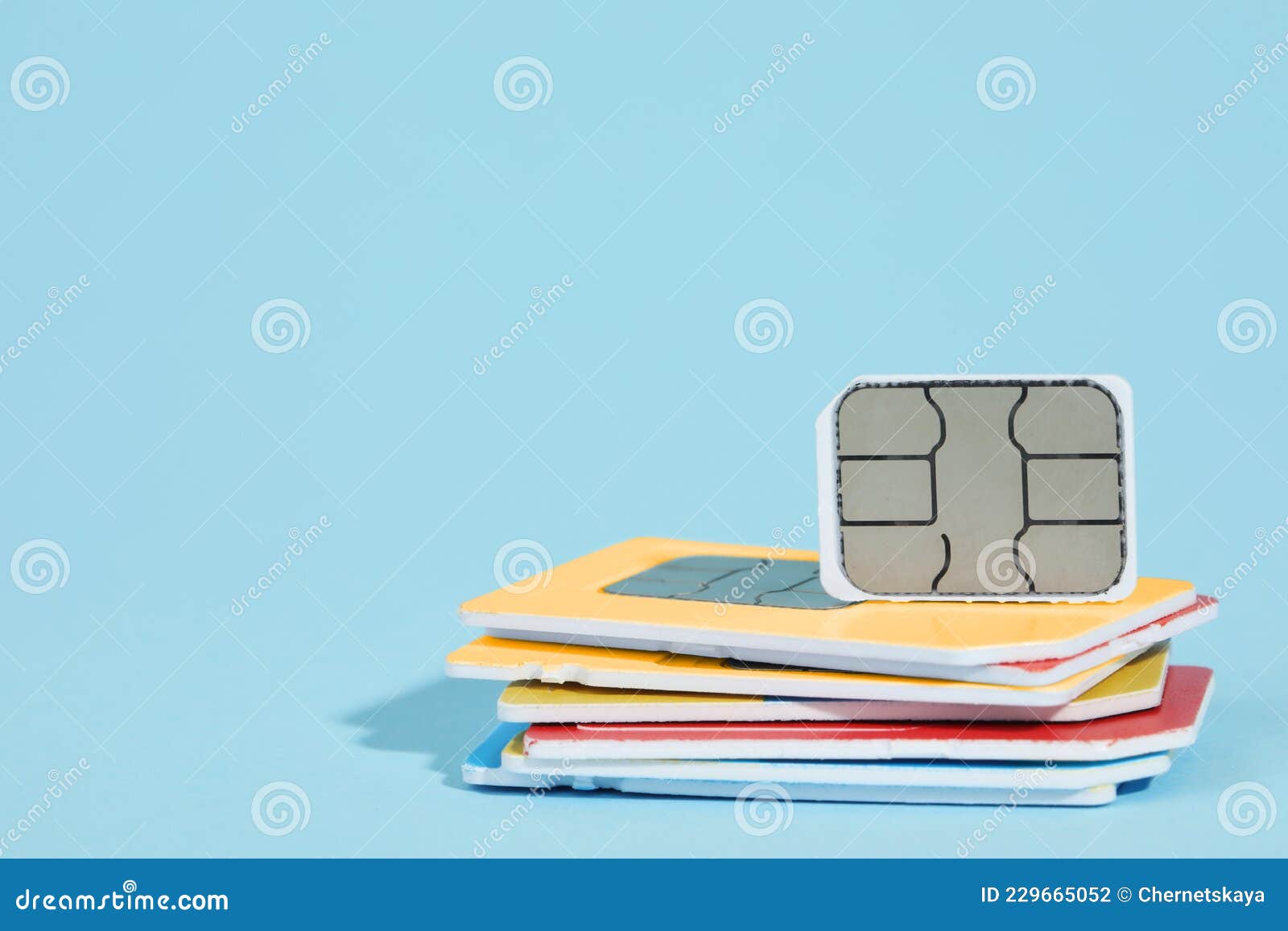 Different SIM Cards on Light Blue Background. Space for Text Stock ...