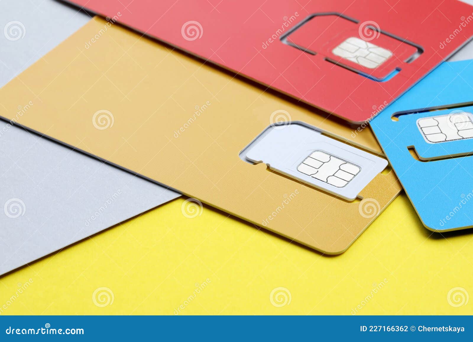 Different SIM Cards on Yellow Background, Closeup Stock Photo - Image ...