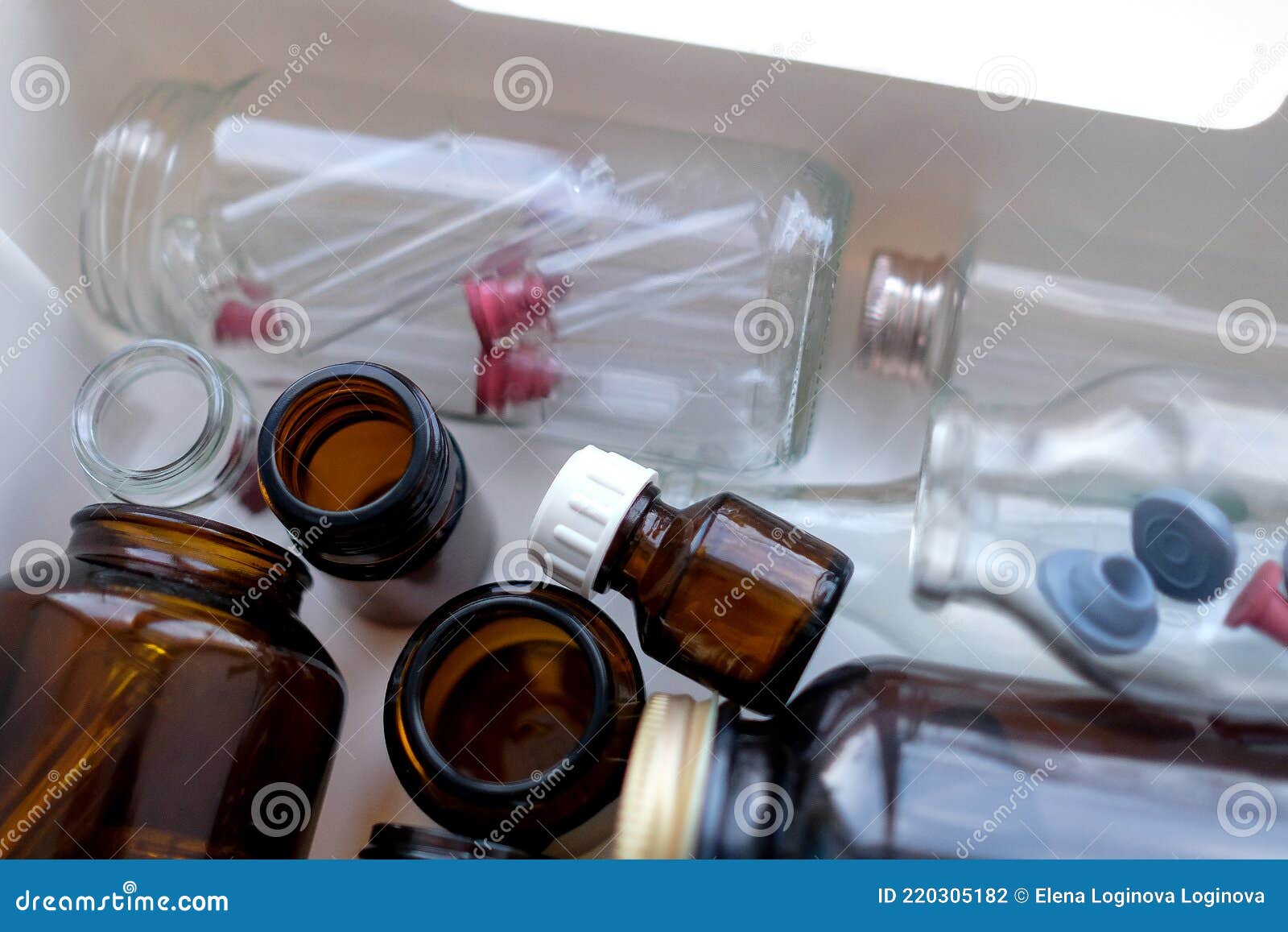 Different Size Glass Bottles in a Box Stock Photo - Image of ...