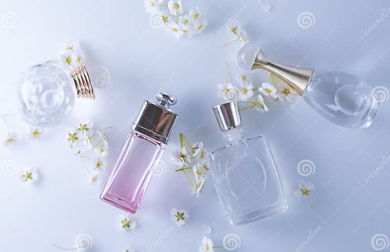 Different Small Bottles of Perfume with Flowers Editorial Photography ...