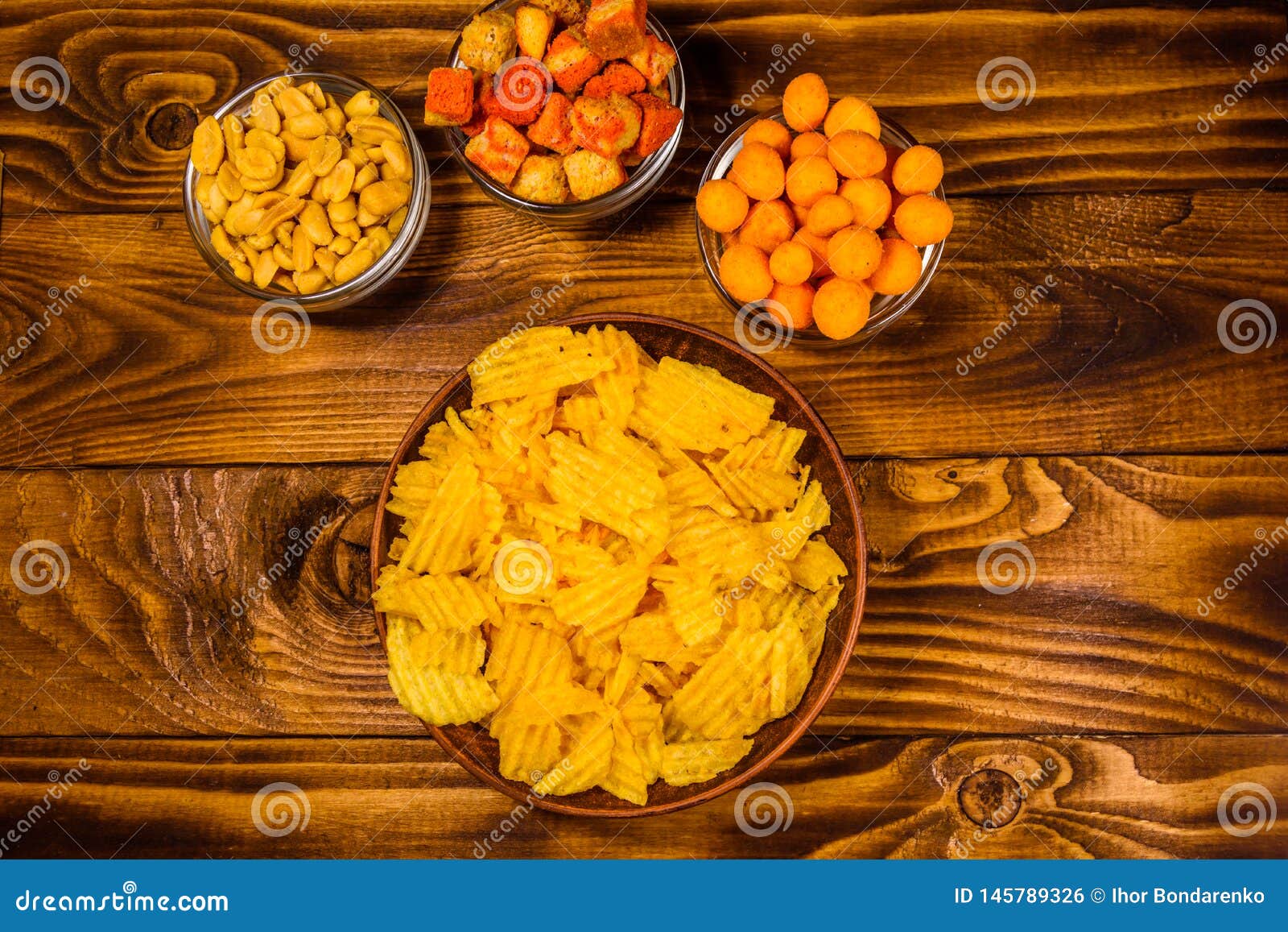Different Snacks for Beer on Wooden Table. Top View Stock Photo - Image ...