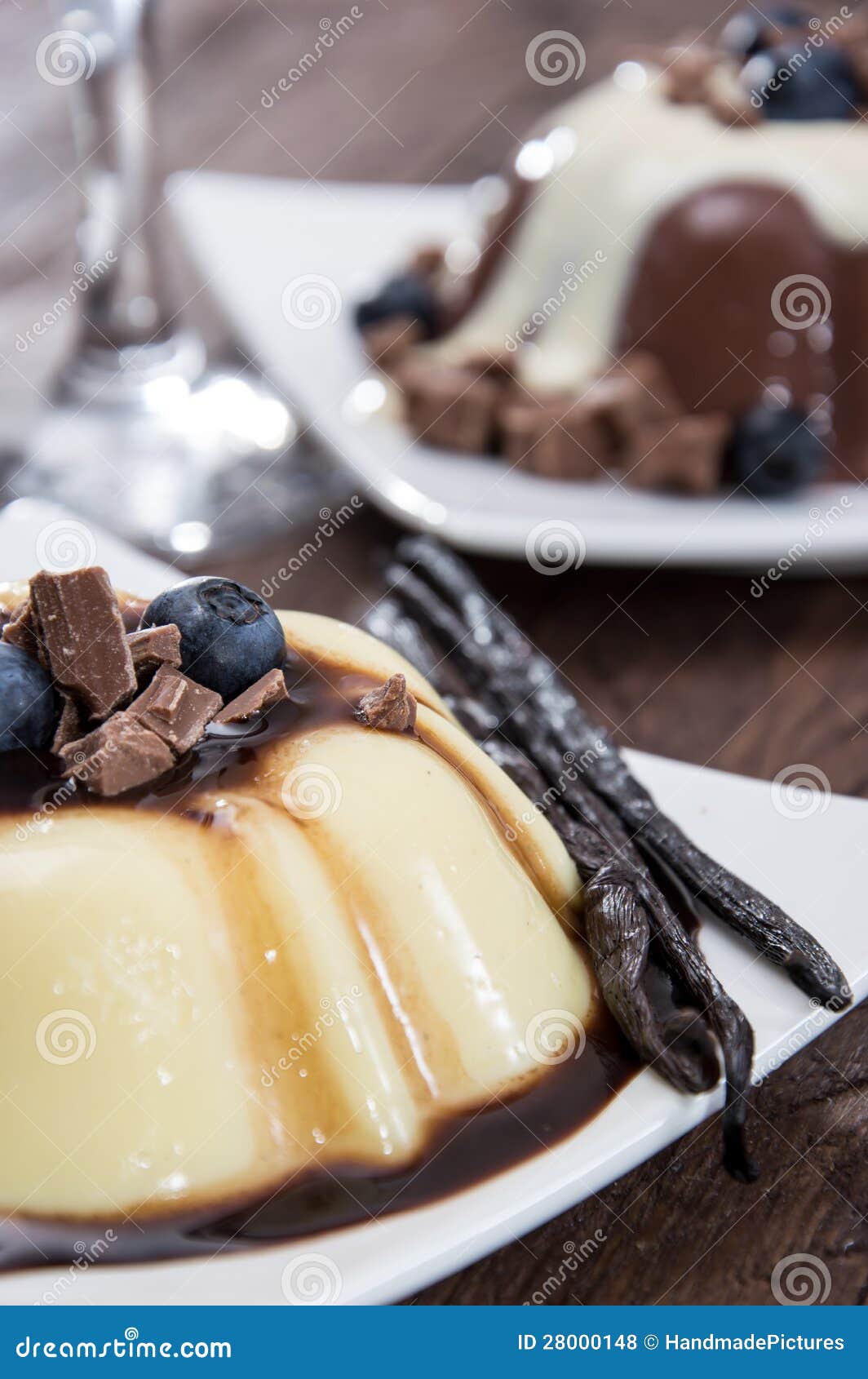 Different Sorts of Pudding on Wooden Background Stock Photo - Image of ...