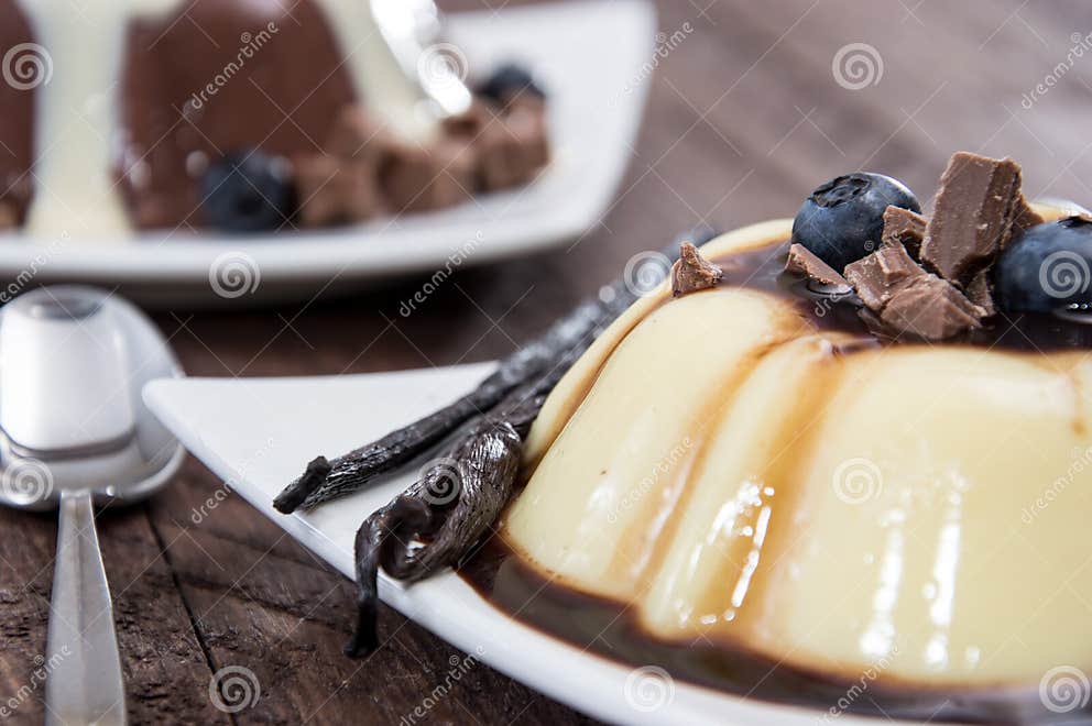 Different Sorts of Pudding on Wooden Background Stock Image - Image of ...