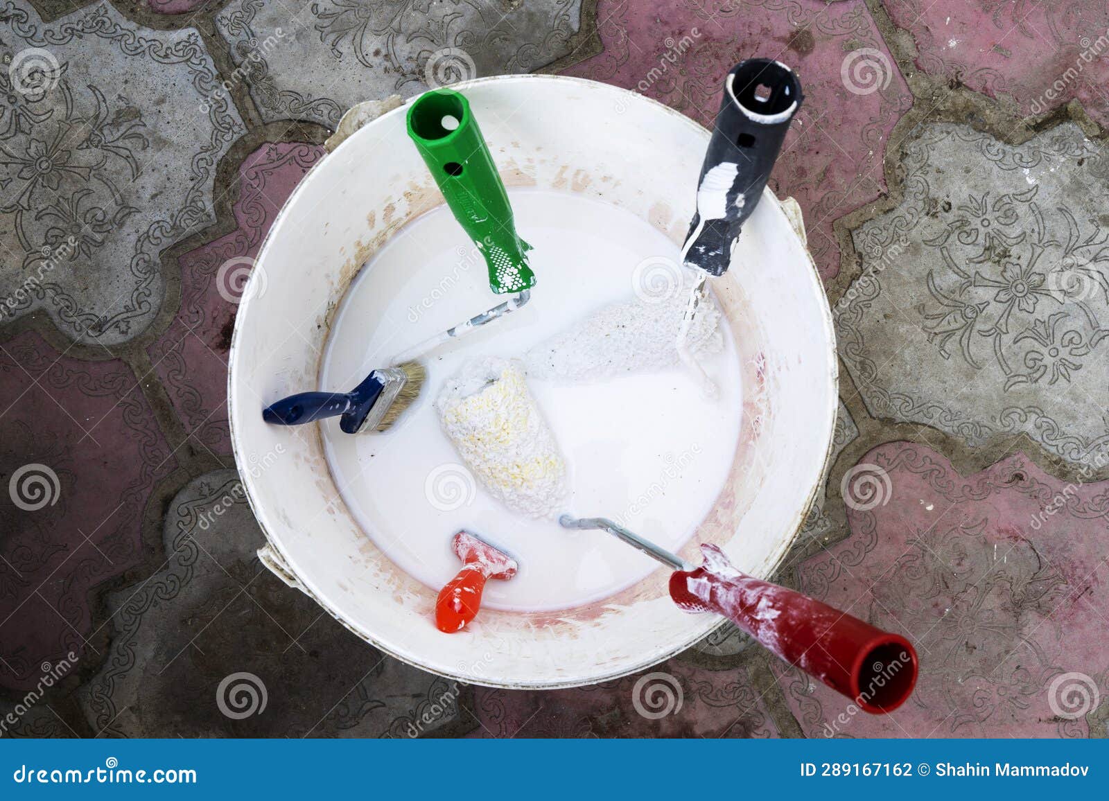 Bucket With Emulsion Paint And Used Tools For Painting Royalty-Free ...