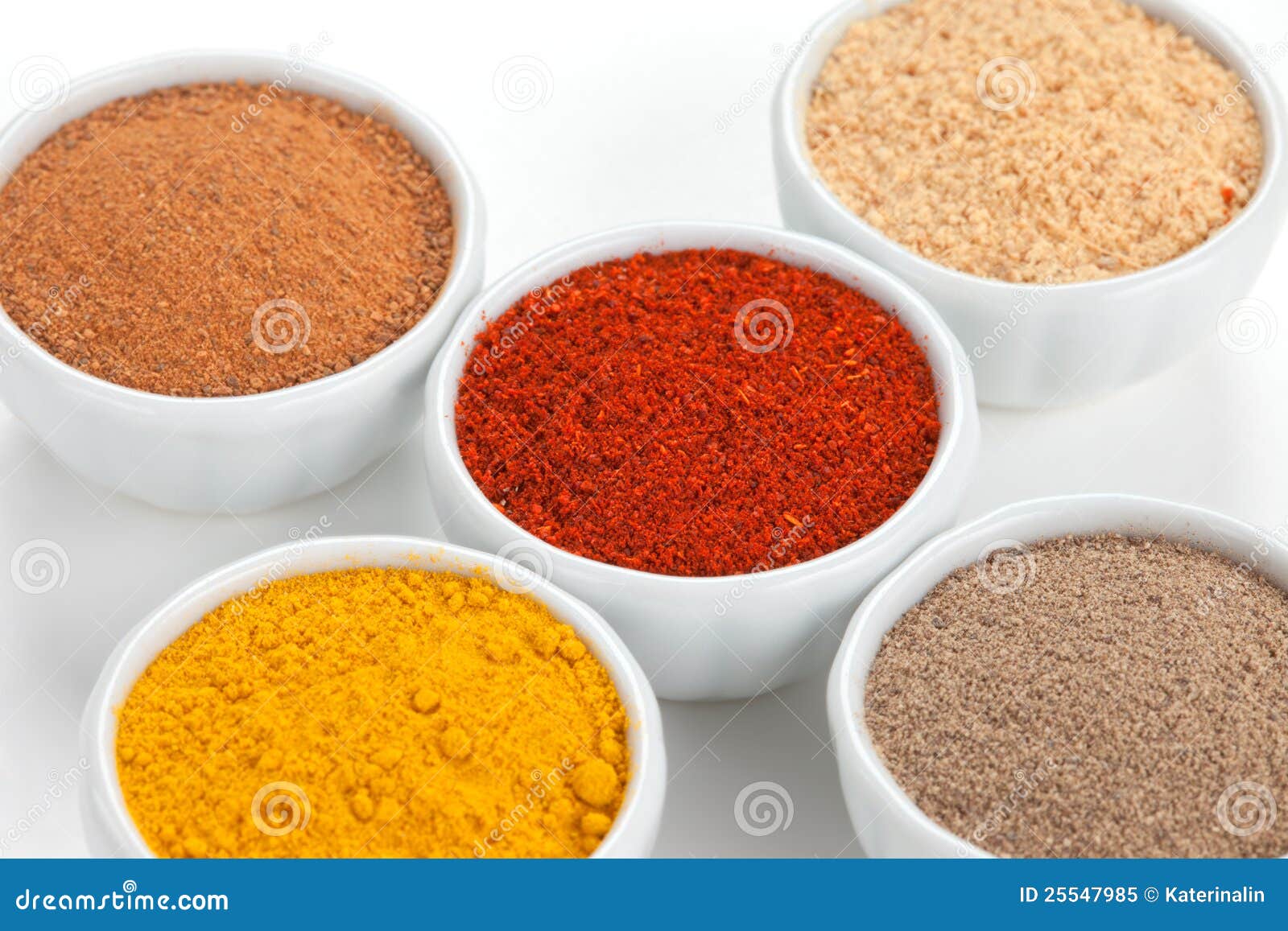 Different Spices in Bowls Isolated on White. Stock Image - Image of ...