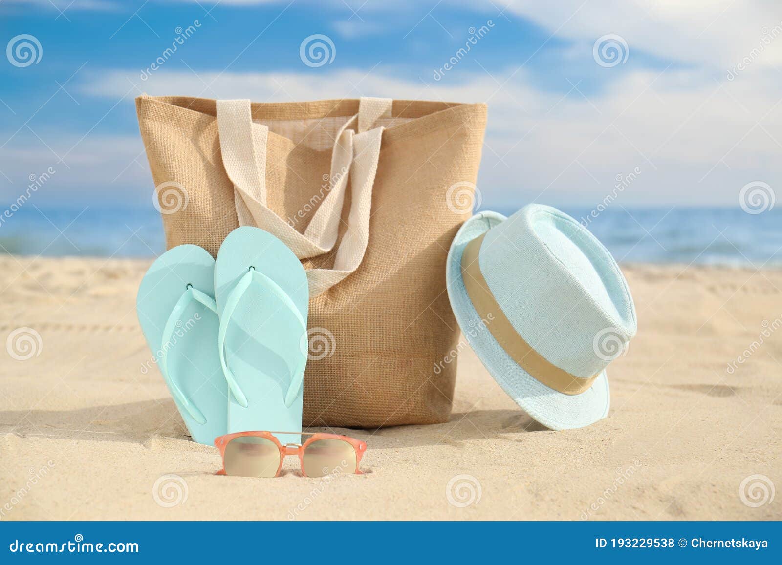 Different Beach Objects on Sand Near Sea Stock Photo - Image of sandy ...