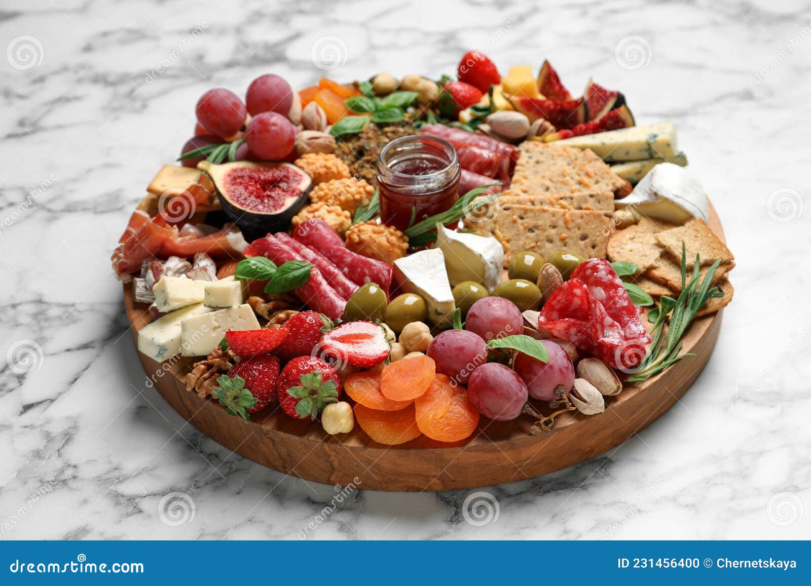 Different Tasty Appetizers on White Marble Table Stock Photo - Image of ...