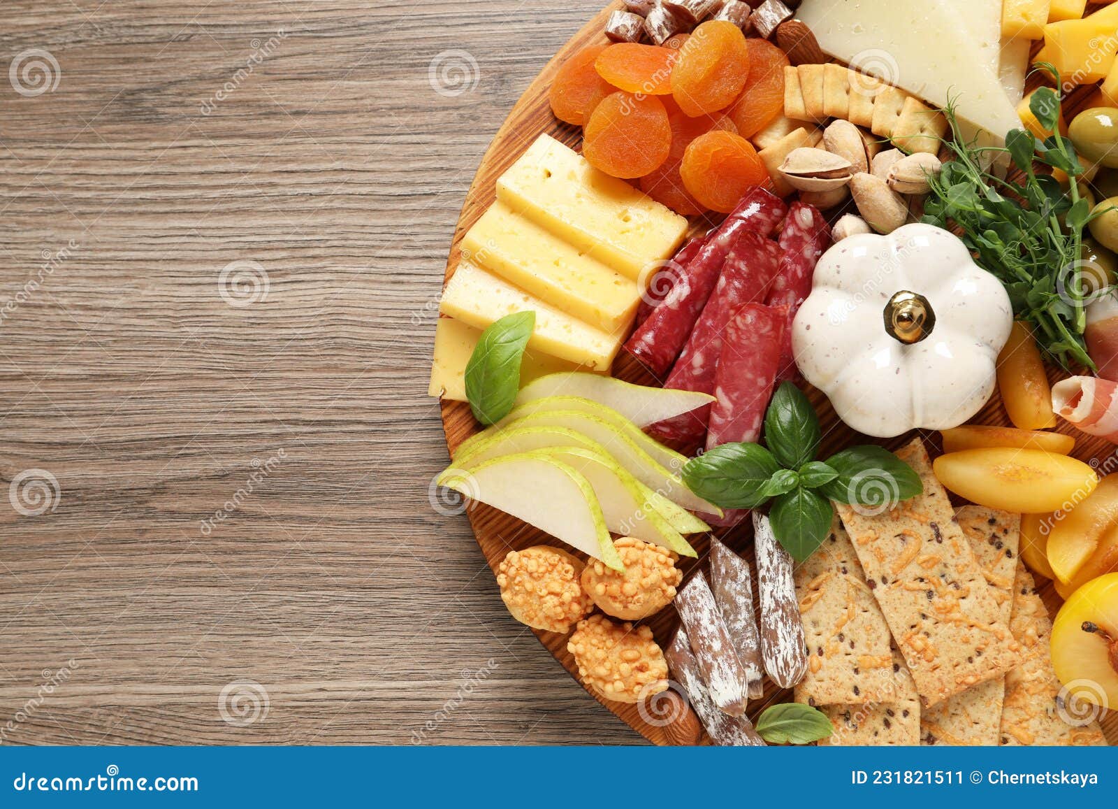 Different Tasty Appetizers on Wooden Table, Top View. Space for Text ...