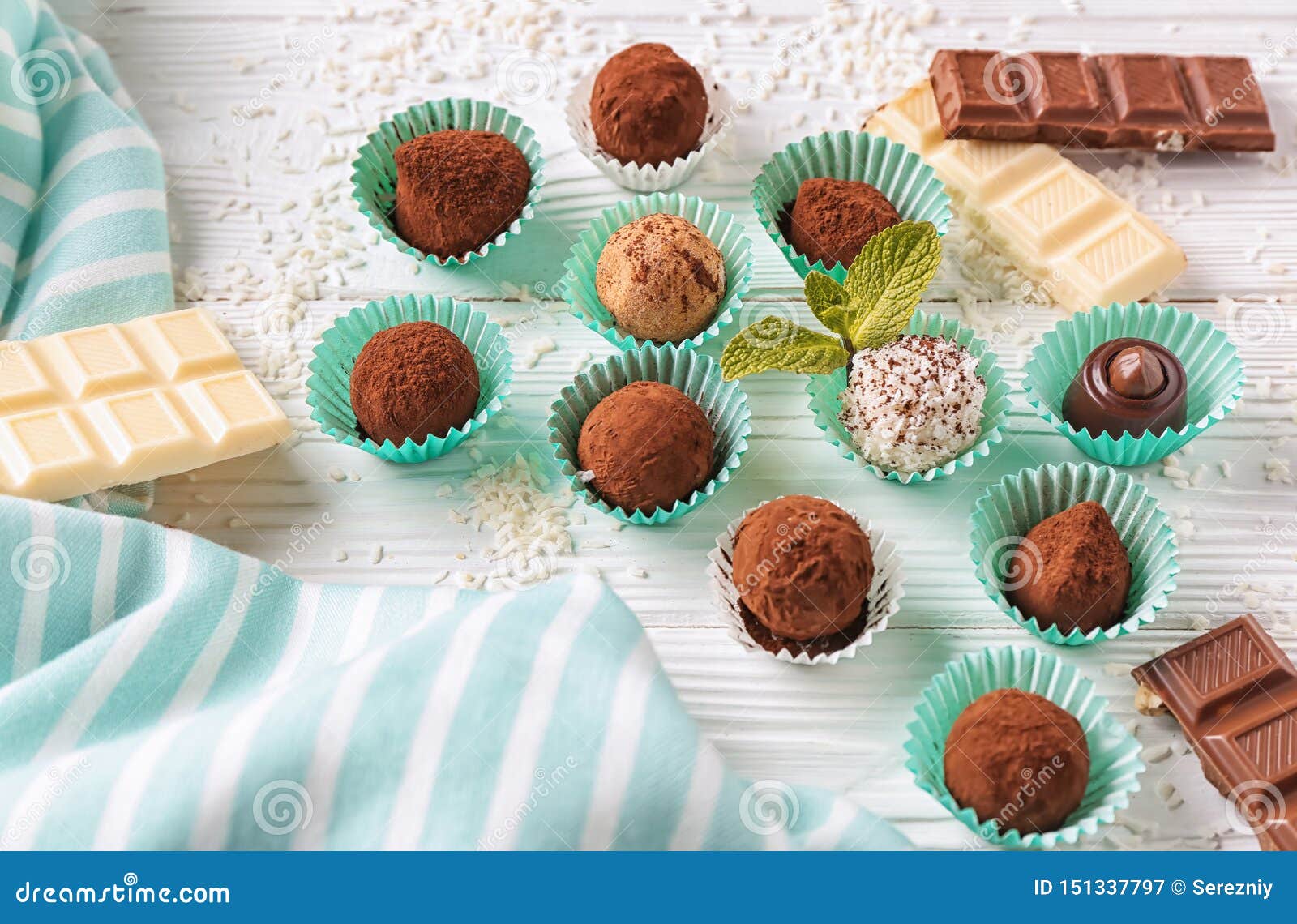 Different Tasty Chocolate Truffles on Light Table Stock Image - Image ...