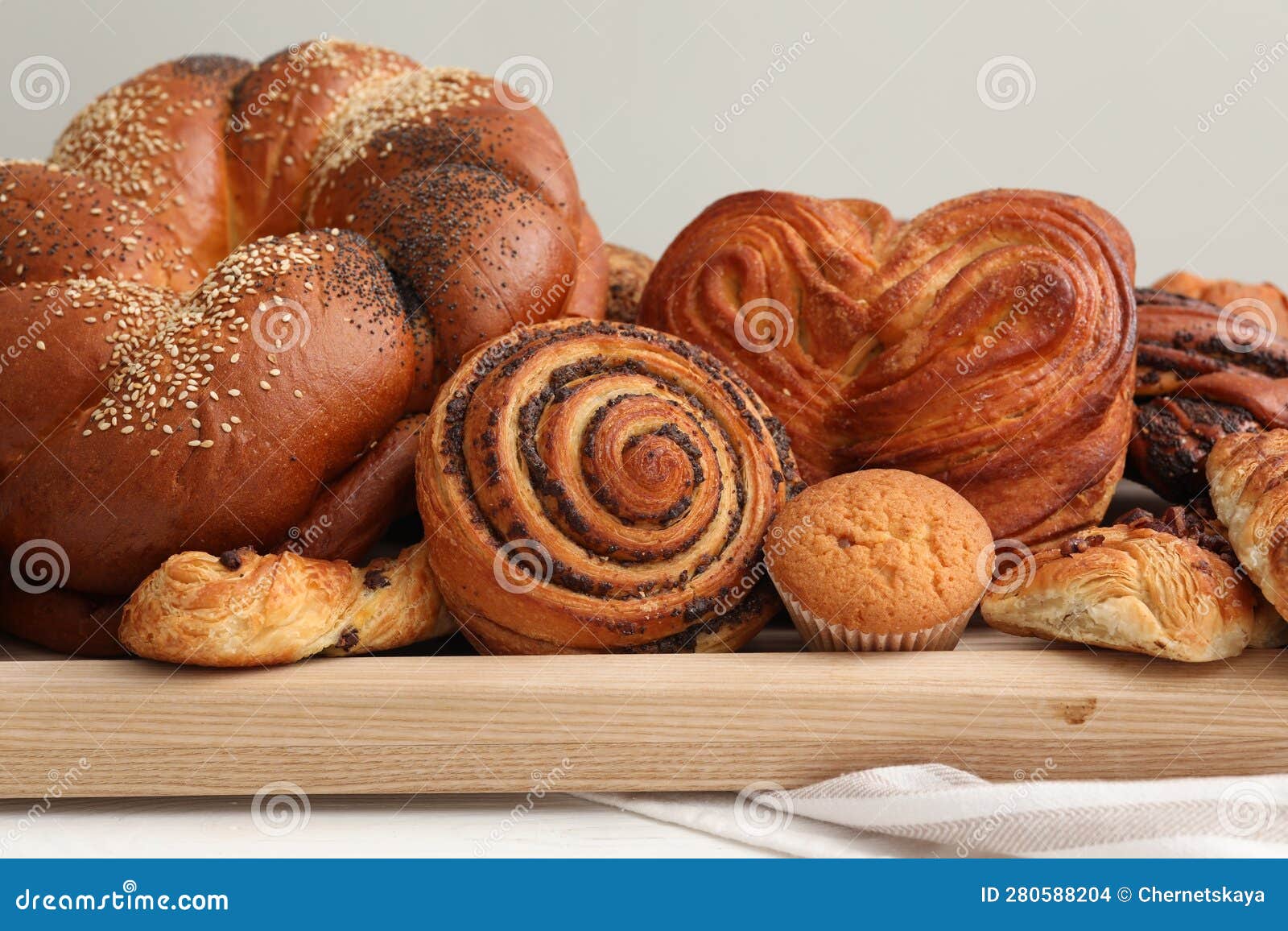 Different Tasty Freshly Baked Pastries on Table Stock Photo - Image of ...