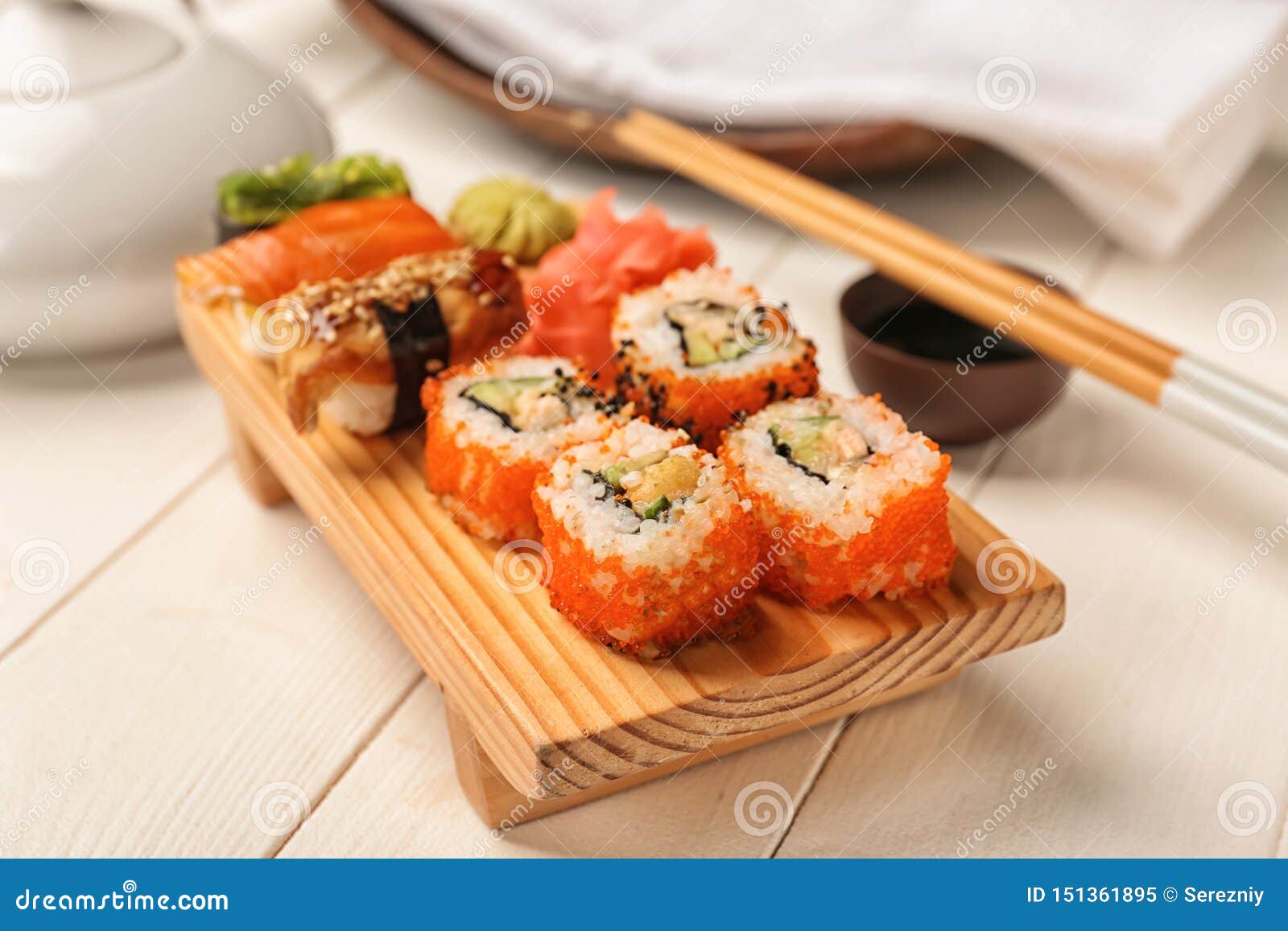 Different Tasty Sushi on Wooden Stand Stock Image - Image of assortment ...