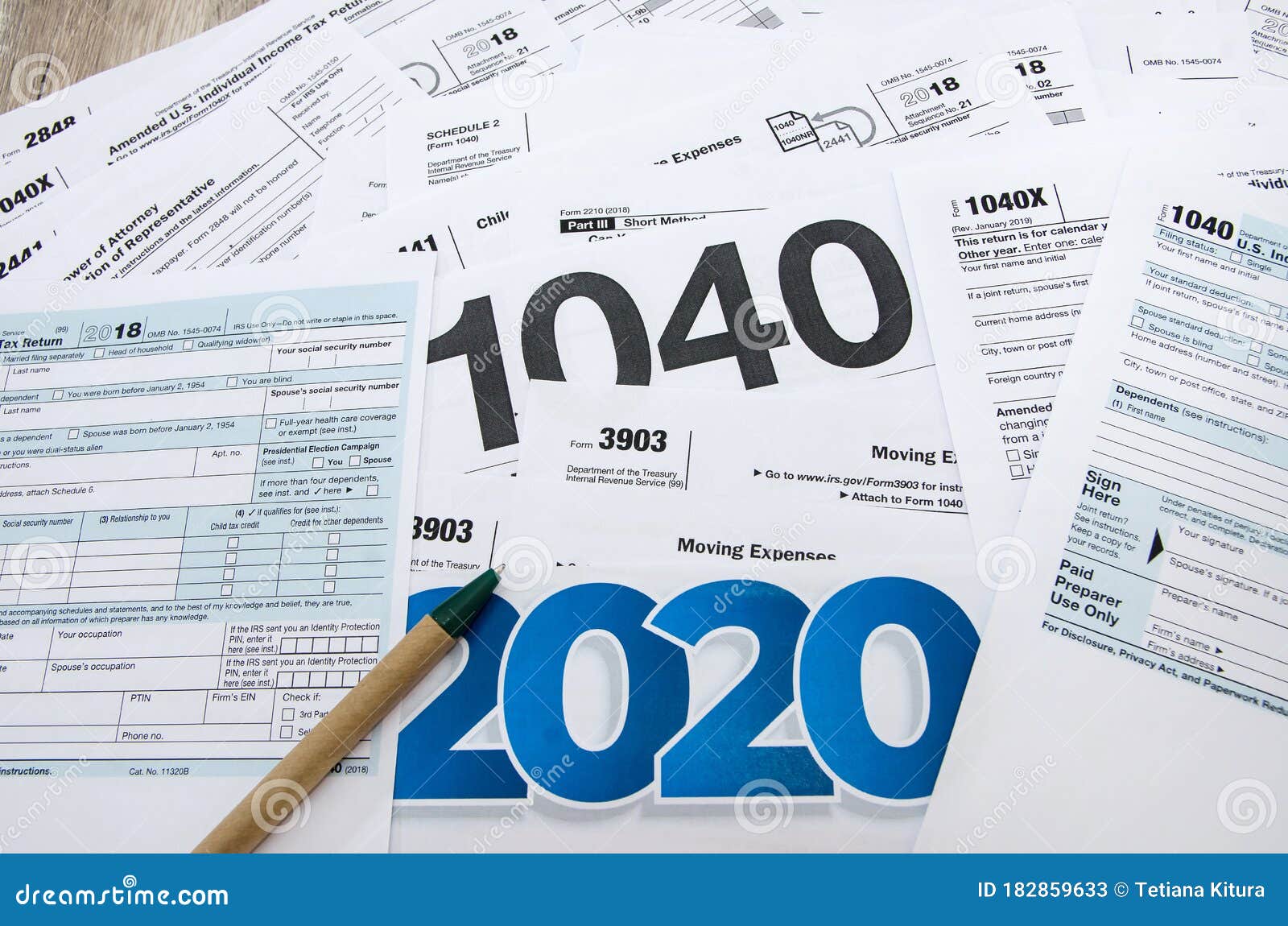 Different Tax Forms with Pen on a Wooden Table Editorial Stock Photo ...