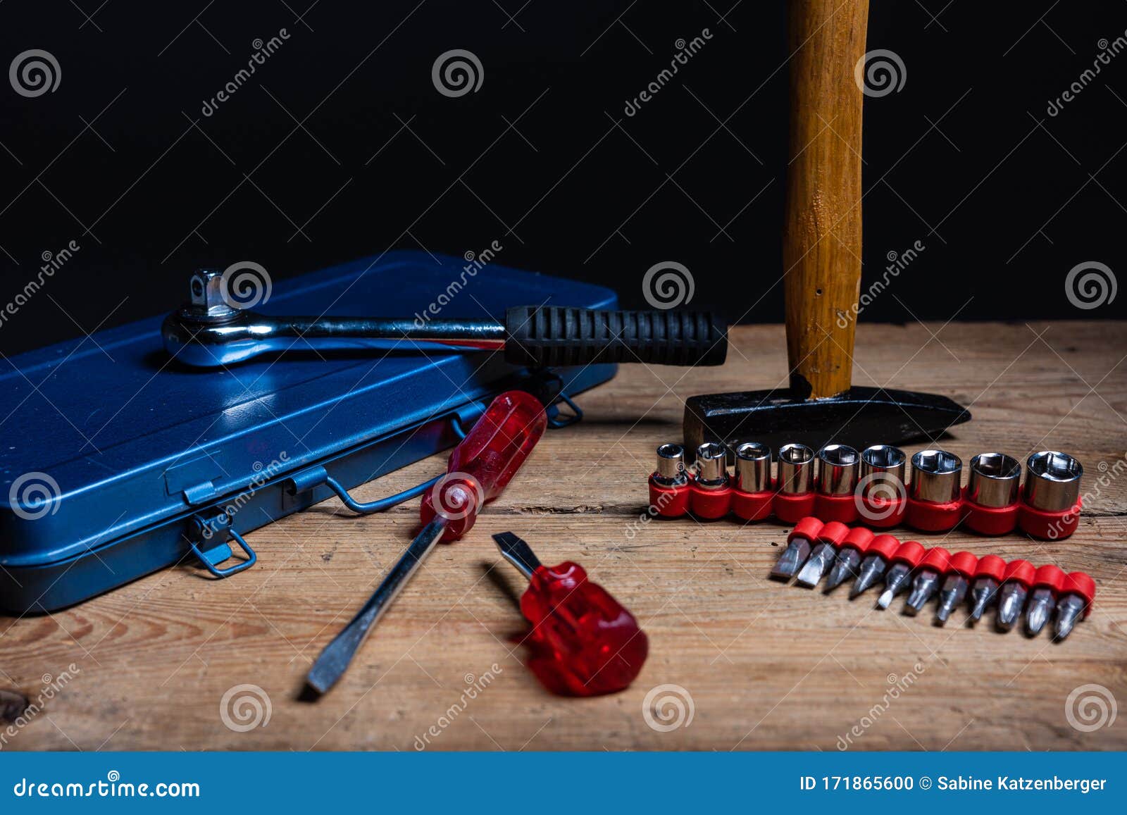 Different Tools and a Blue Tool Box on a Wooden Surface Stock Photo ...