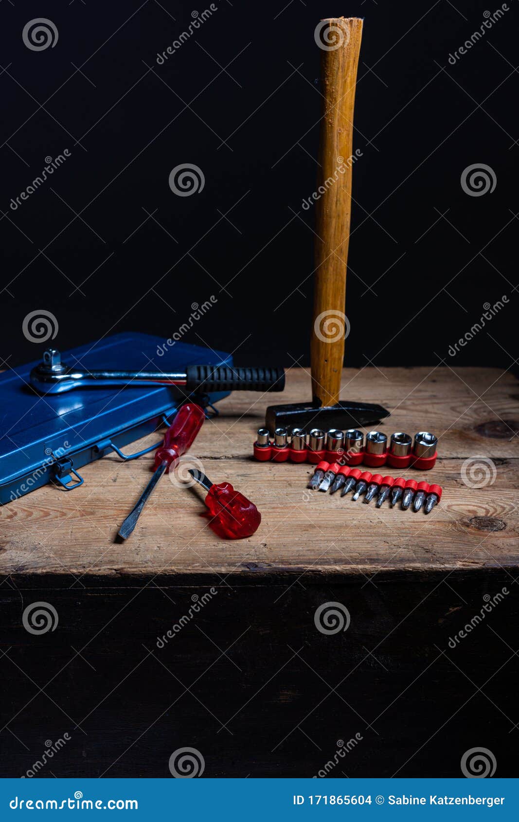 Different Tools and a Blue Tool Box on a Wooden Surface Stock Photo ...