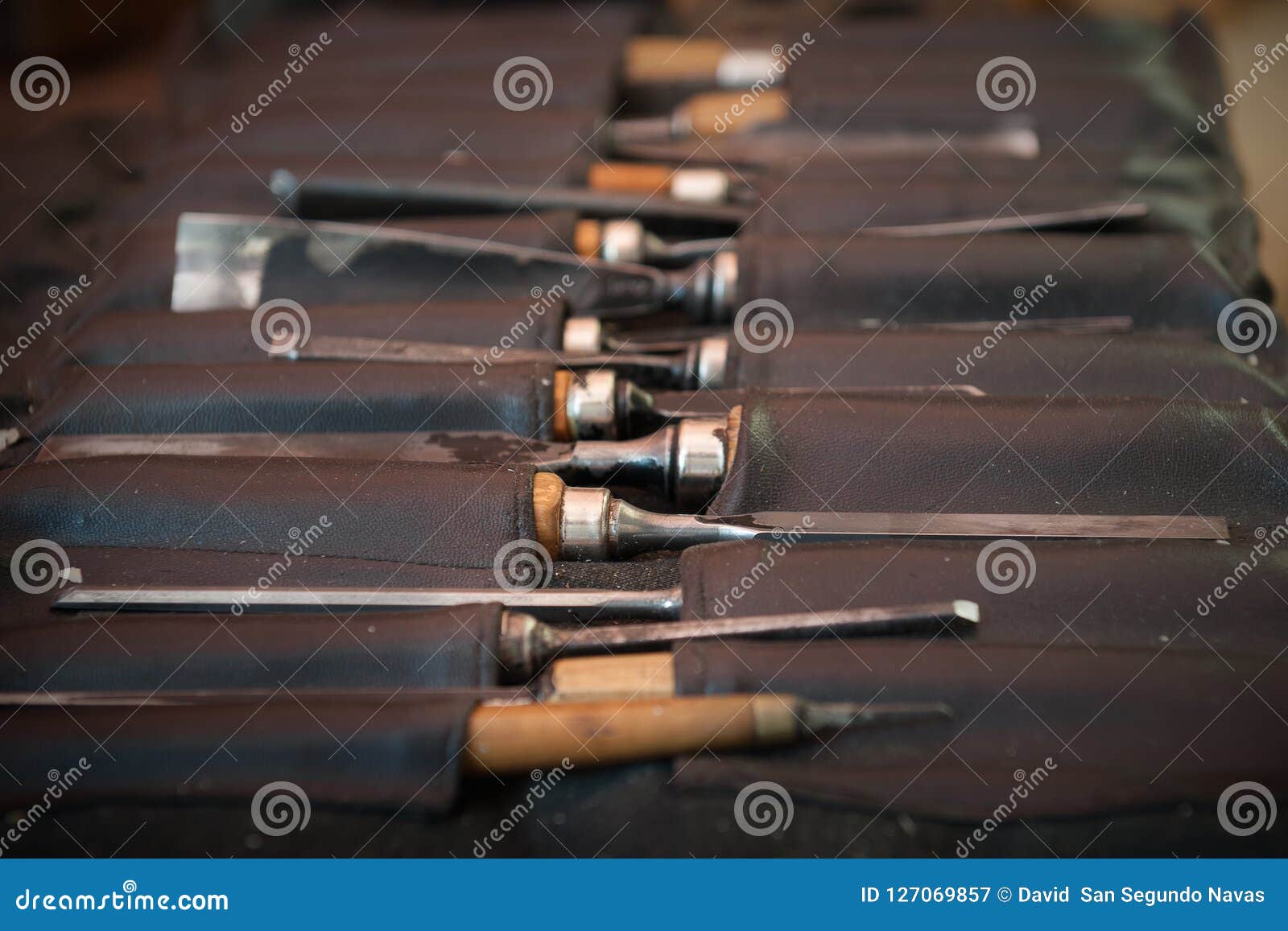 Gouges and Chisels in the Foreground Leather Case Stock Image - Image ...