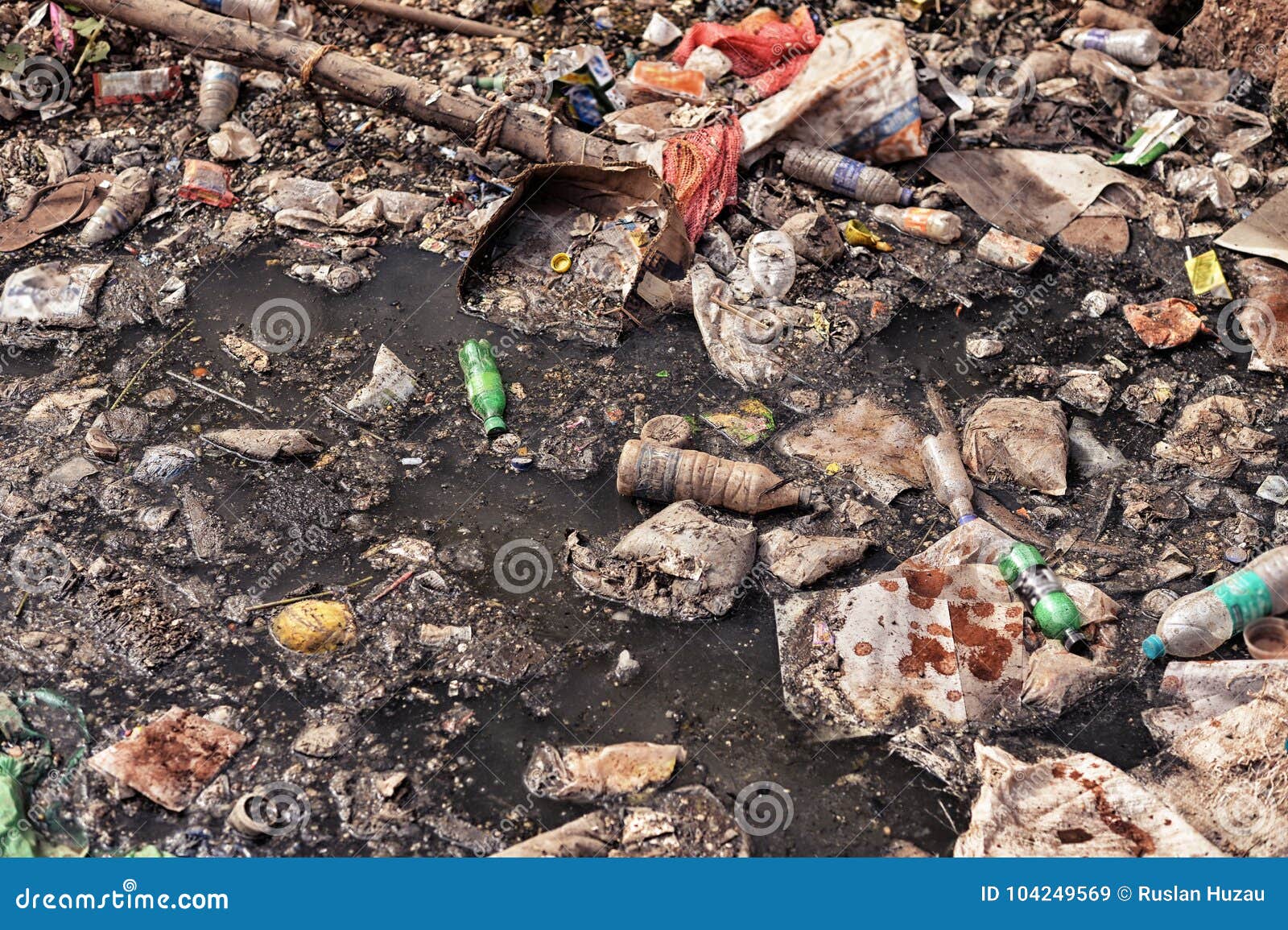 Trash on wet ground stock image. Image of mechanical - 104249569