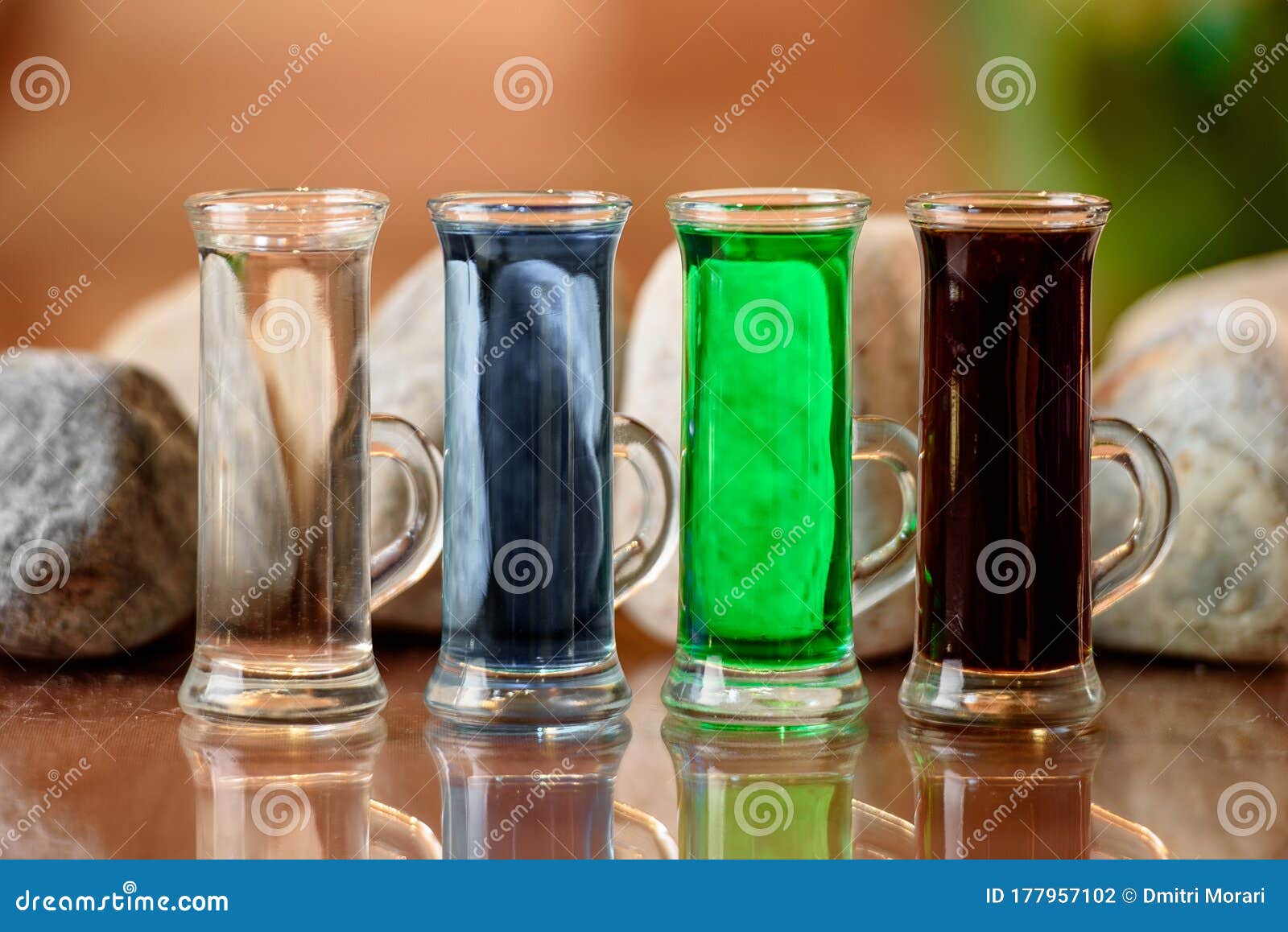 Multi-colored Alcohol in Shots on a Background of Stones. Stock Photo ...