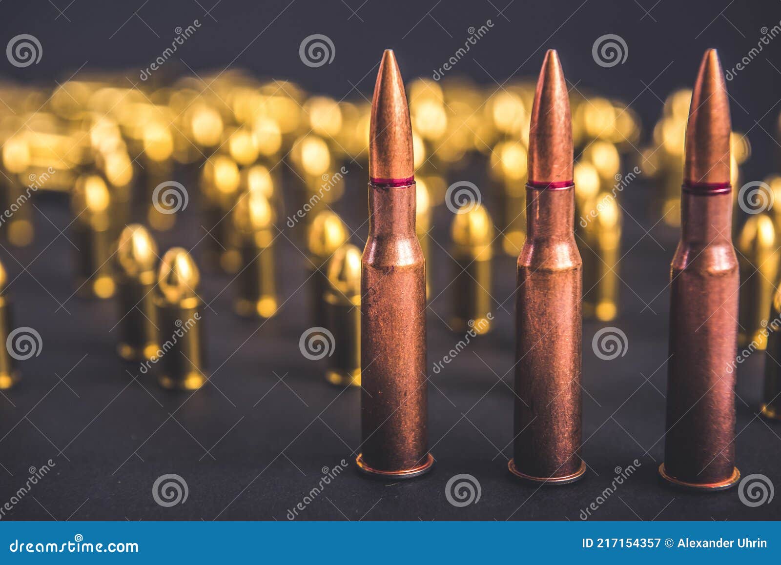 Different Types of Ammunition on Dark Stone. Blur Bullets Backround ...