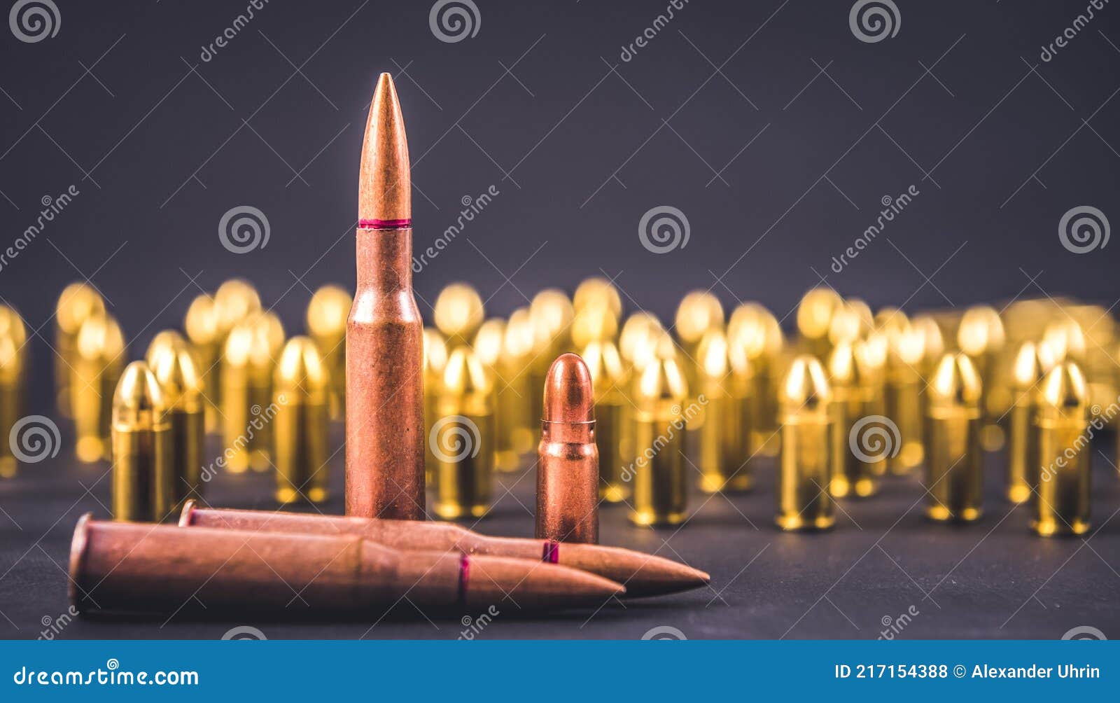Different Types of Ammunition on Dark Stone. Blur Bullets Backround ...