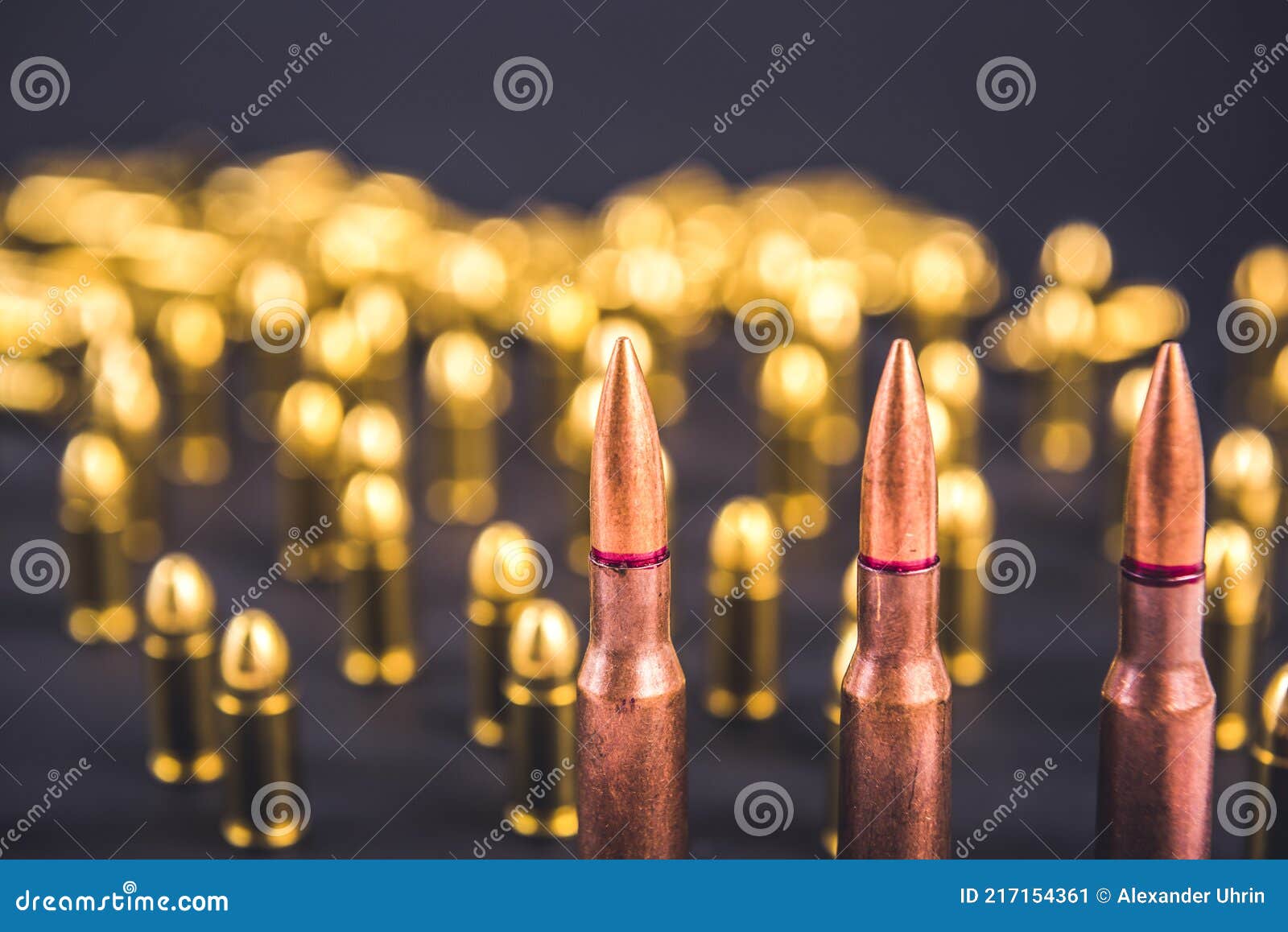 Different Types of Ammunition on Dark Stone. Blur Bullets Backround ...