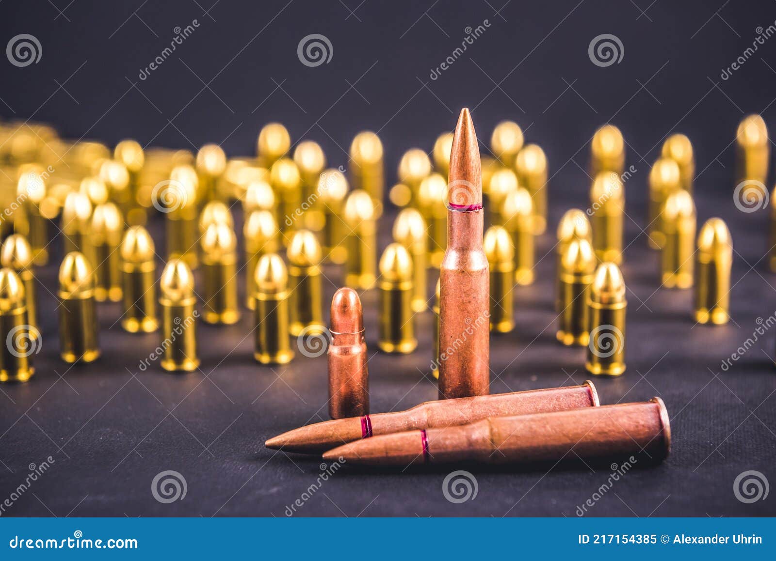 Different Types of Ammunition on Dark Stone. Blur Bullets Backround ...