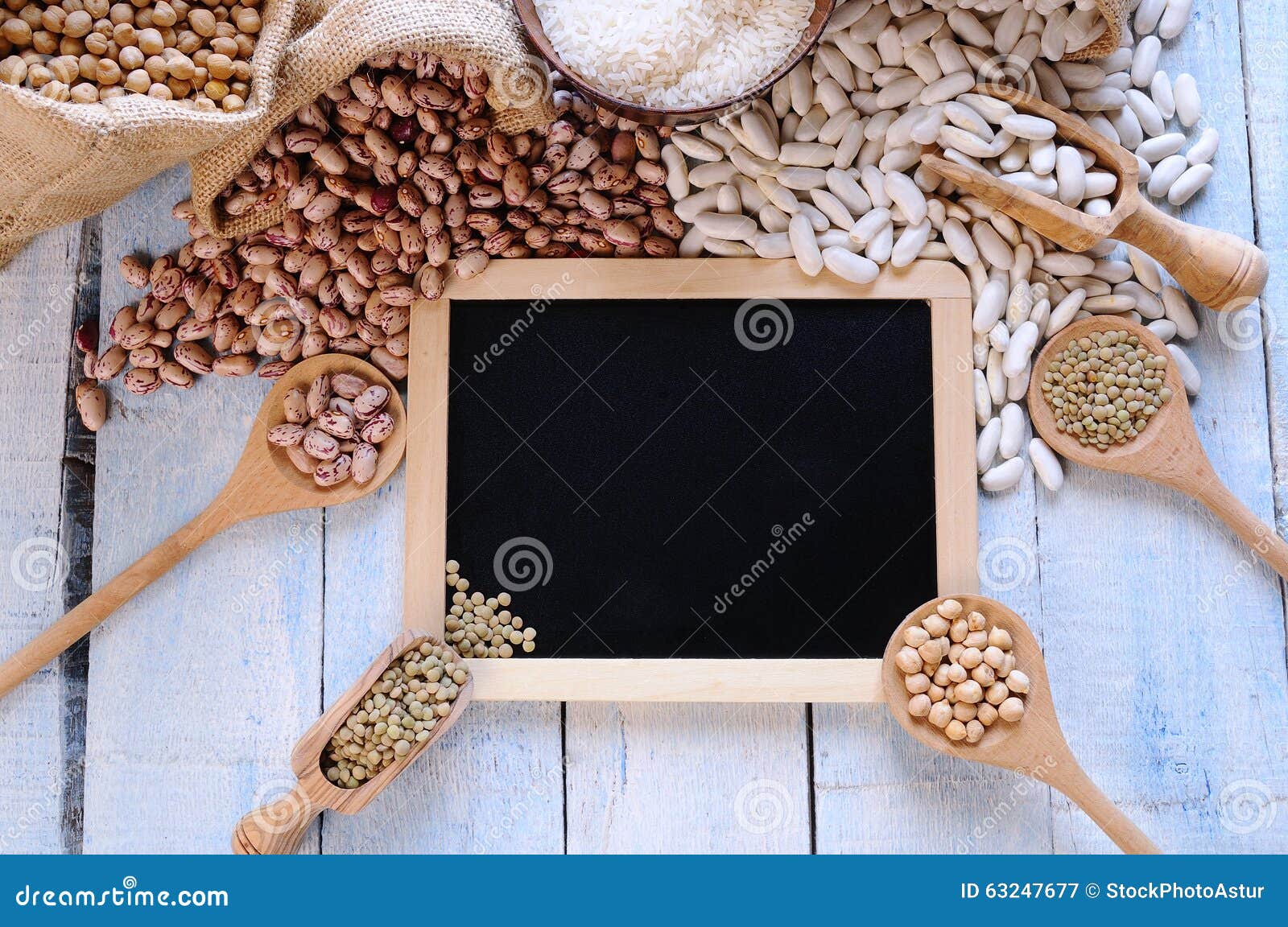 Different Types of Beans Around Black Framed Square on Blue Wood Stock ...