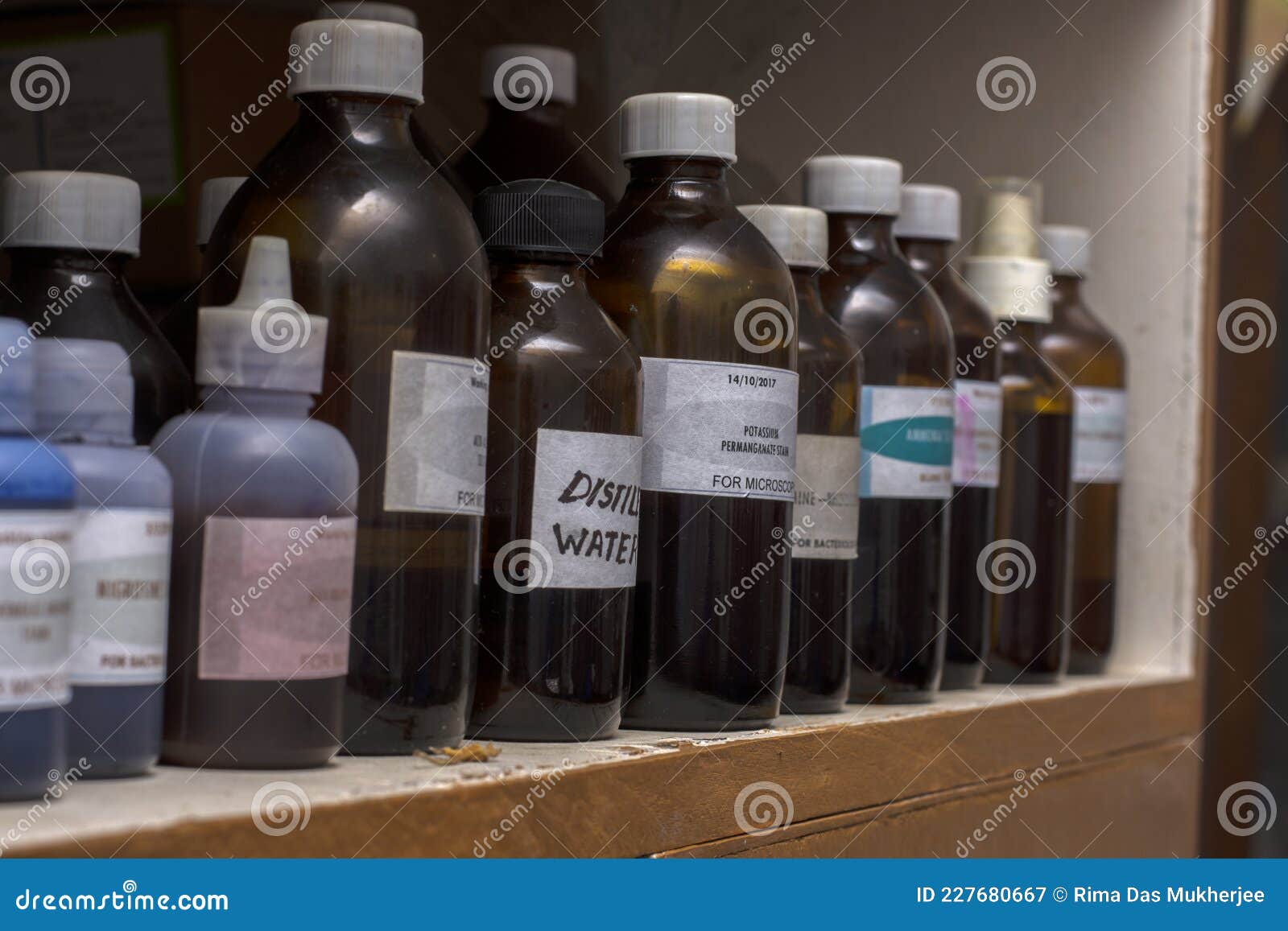 Different Types of Bottles of Solutions for Laboratory Tests with ...