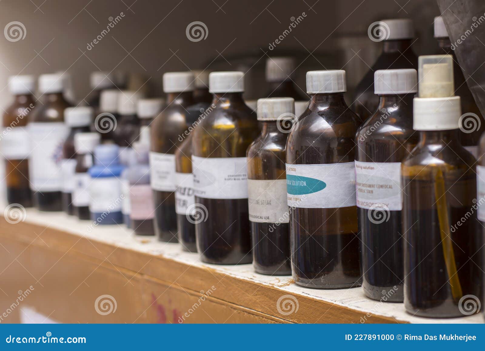 Different Types of Bottles of Solutions for Laboratory Tests with ...