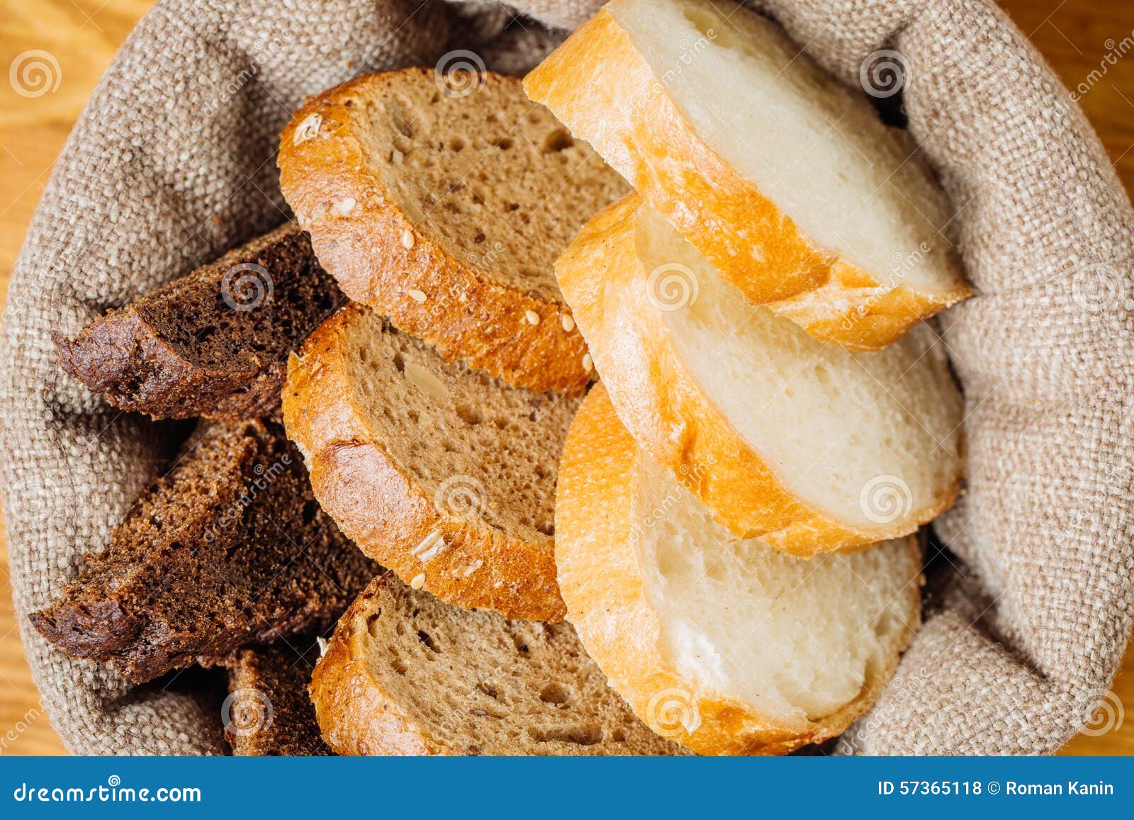 Different Types of Bread in the Basket on the Table Stock Photo - Image ...