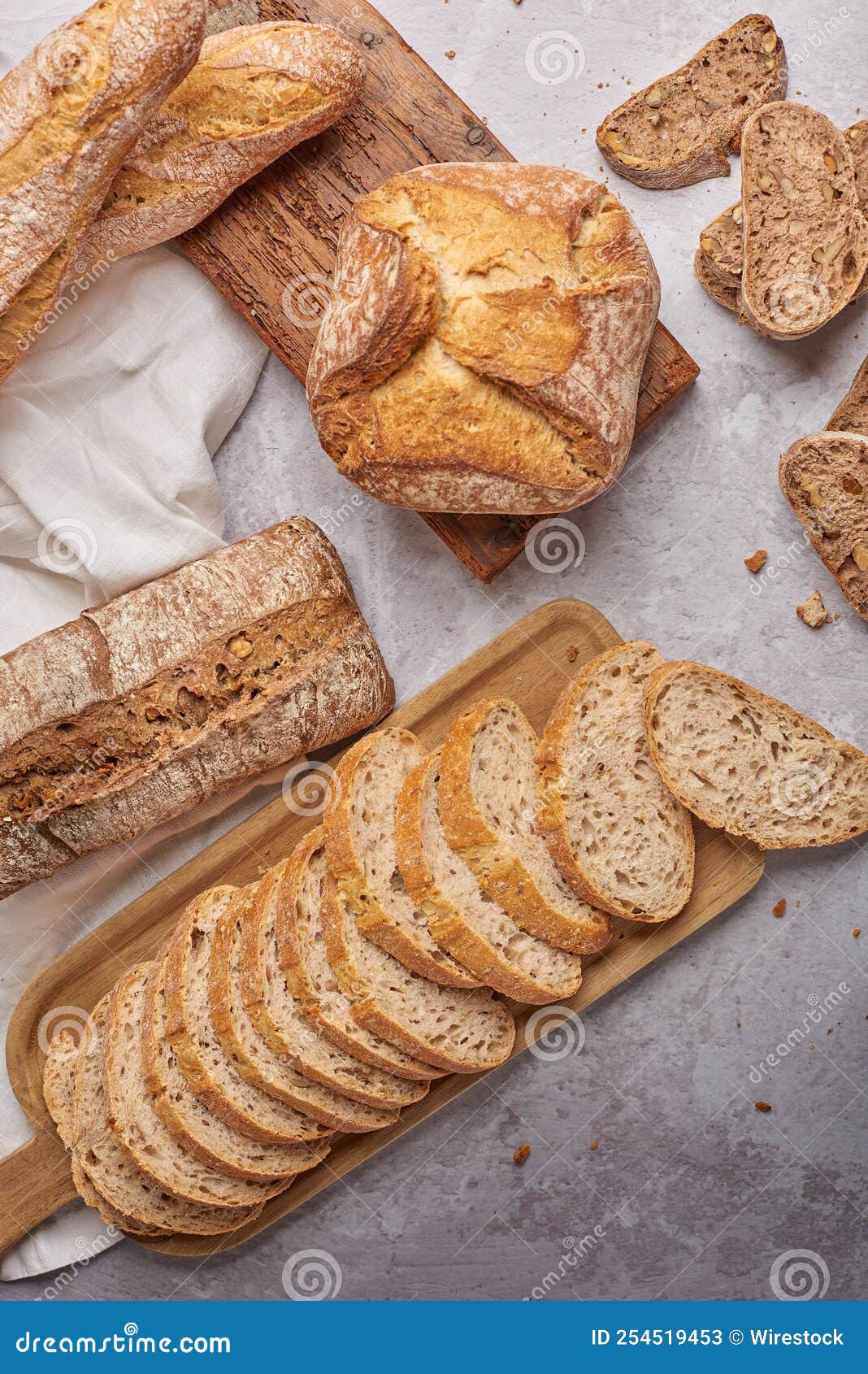 Different Types of Bread with Cut Pieces on Marble Surface Stock Image ...