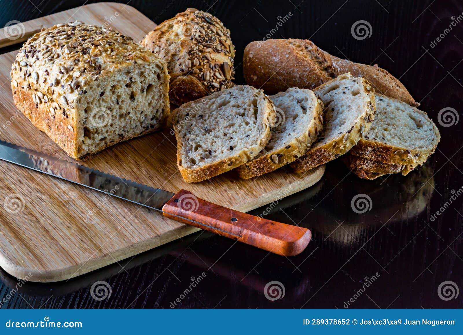 Different Types of Bread Cut into Slices and Whole Stock Photo - Image ...