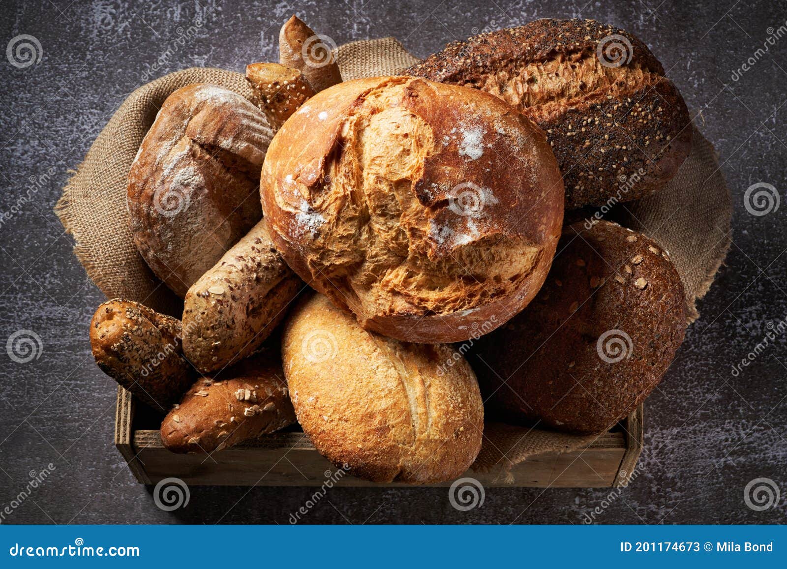 Different Types of Bread Put in a Wooden Box on Dark Background. Bakery ...
