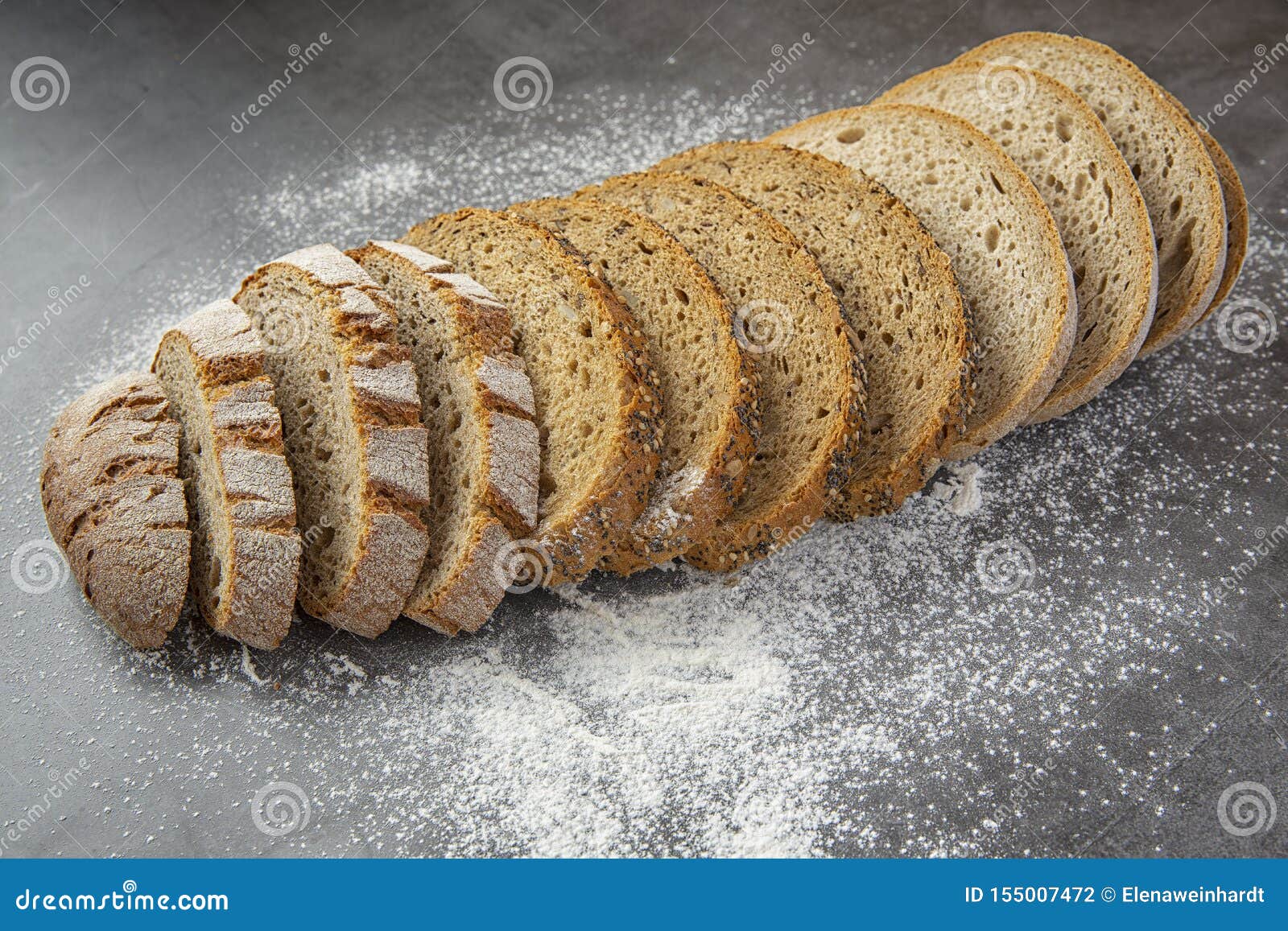 Different Types of Bread Sliced on a Dark Background Stock Photo ...