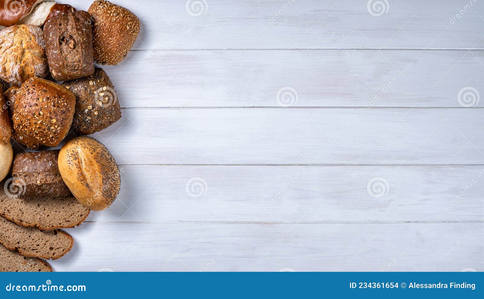 Different Types of Bread on a White Table ,top View. Bakery Products ...